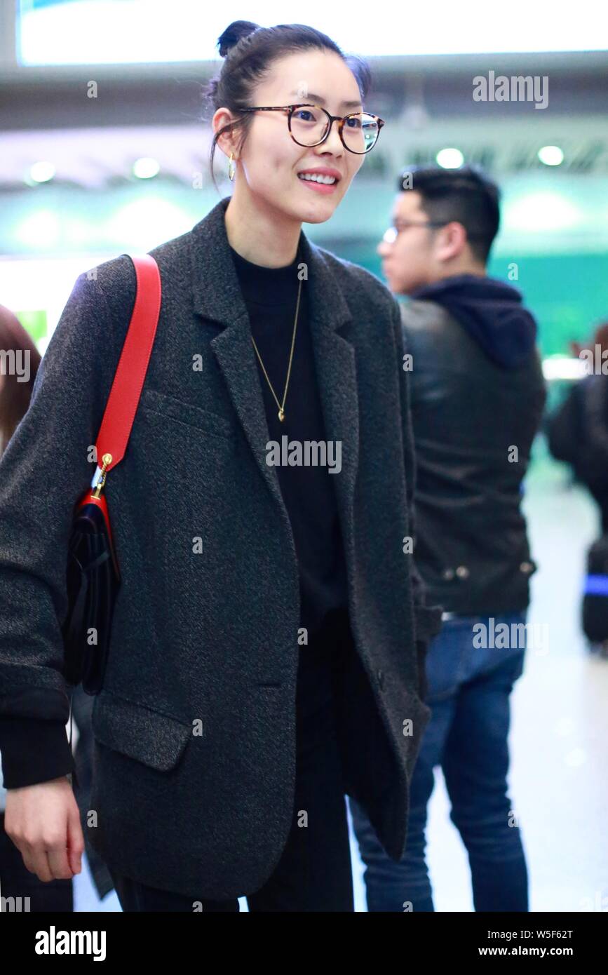 Chinese model Liu Wen arrives at the Beijing Capital International ...
