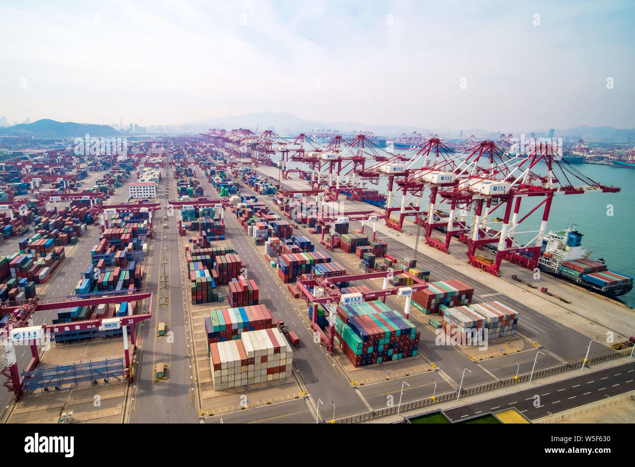 --FILE--An aerial view of containers stacked at the fully automated container terminal at the ...