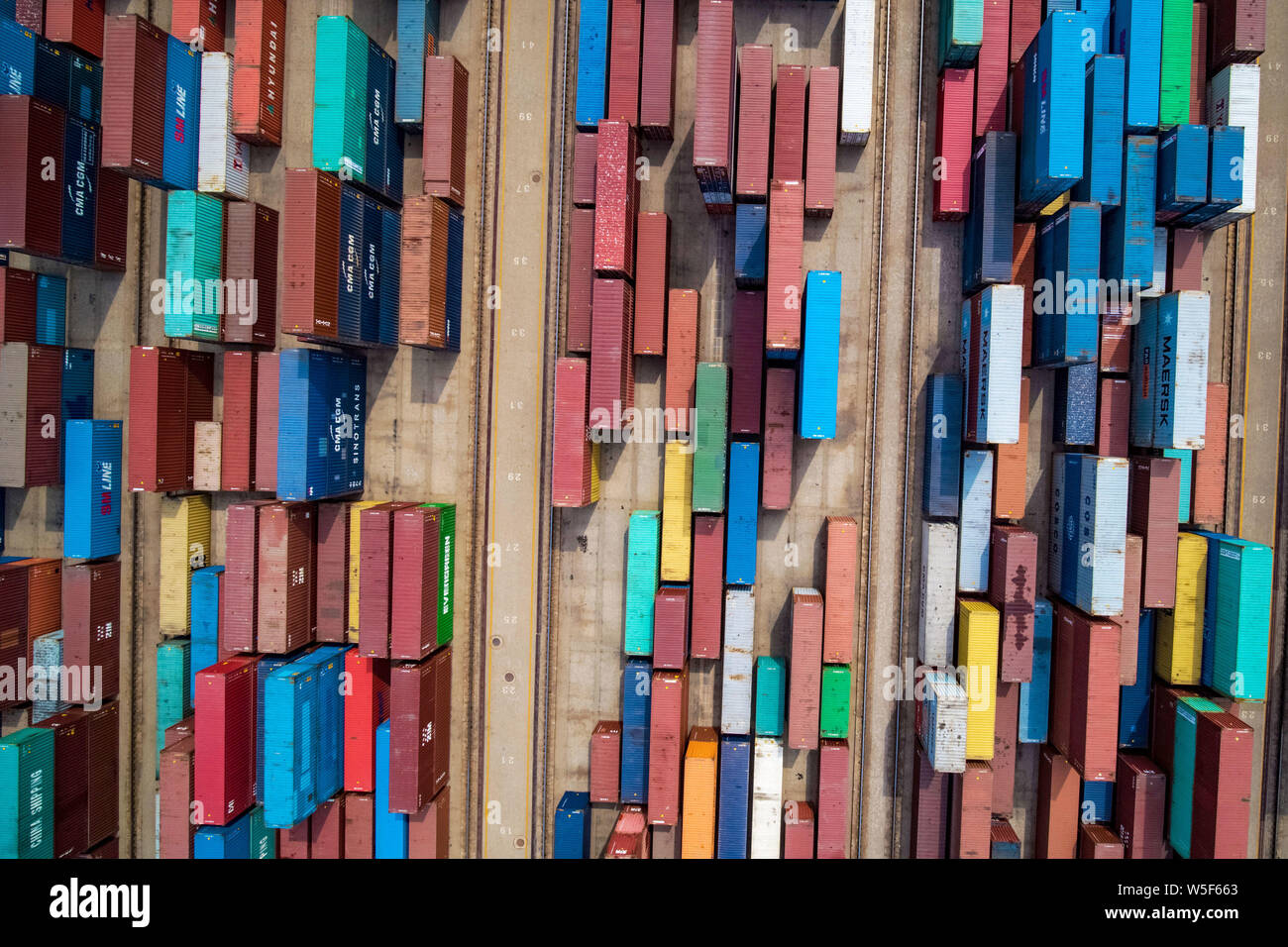 --FILE--An aerial view of containers stacked at the fully automated container terminal at the ...