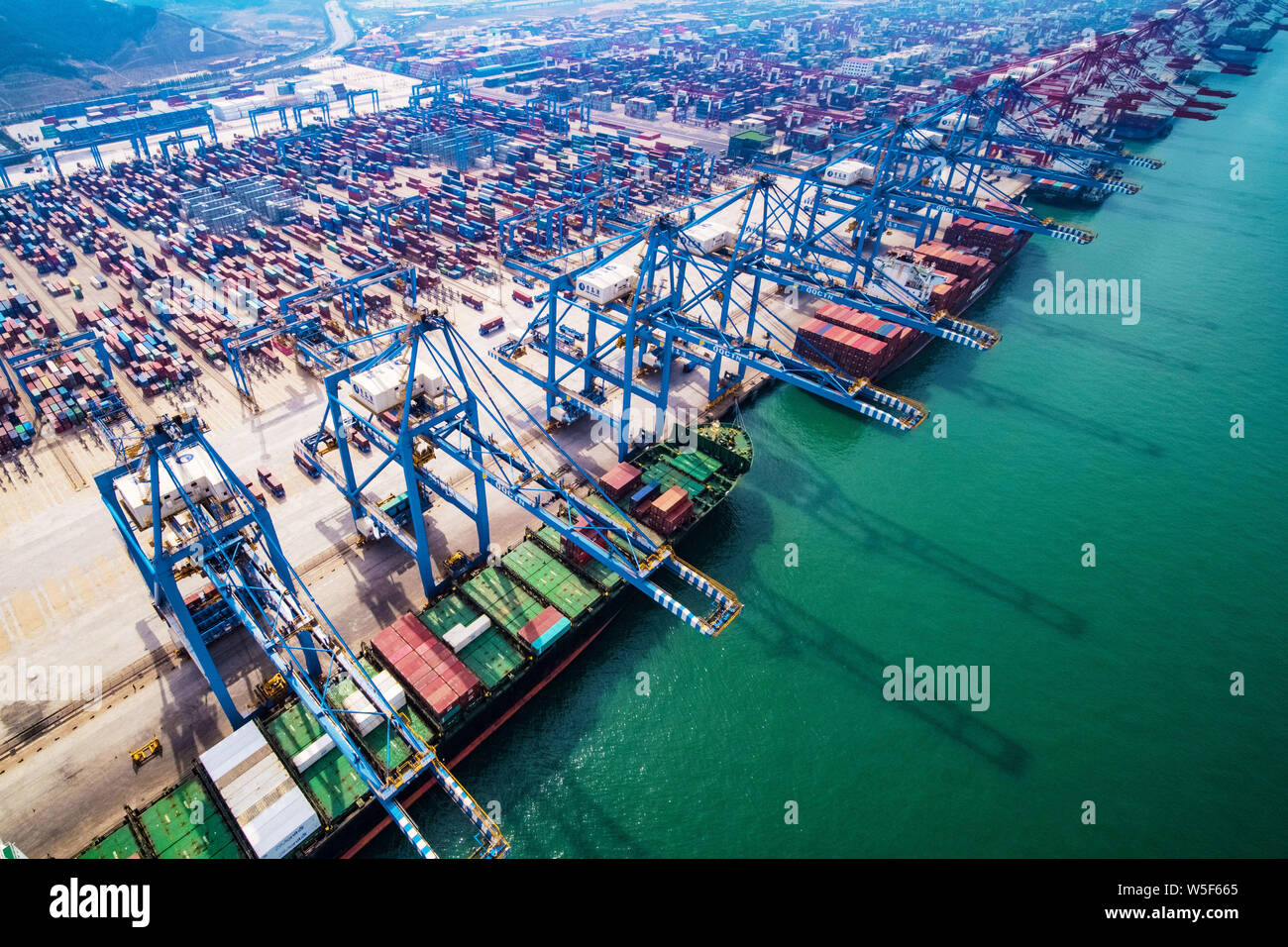 --FILE--An aerial view of containers stacked at the fully automated container terminal at the ...