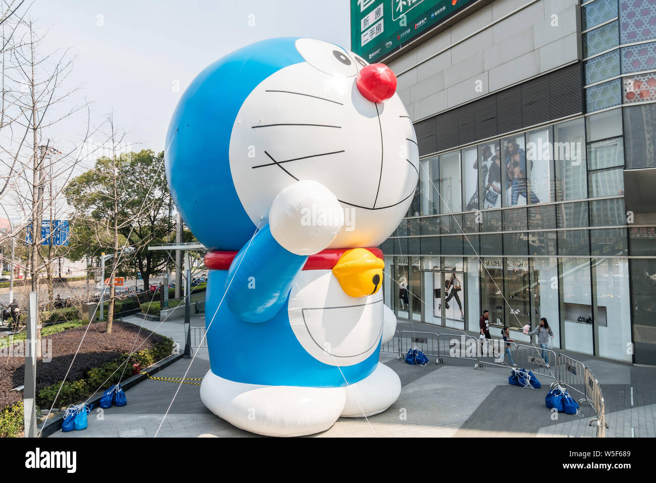 A 10-meter-tall inflated doll featuring shape of Doraemon is displayed ...