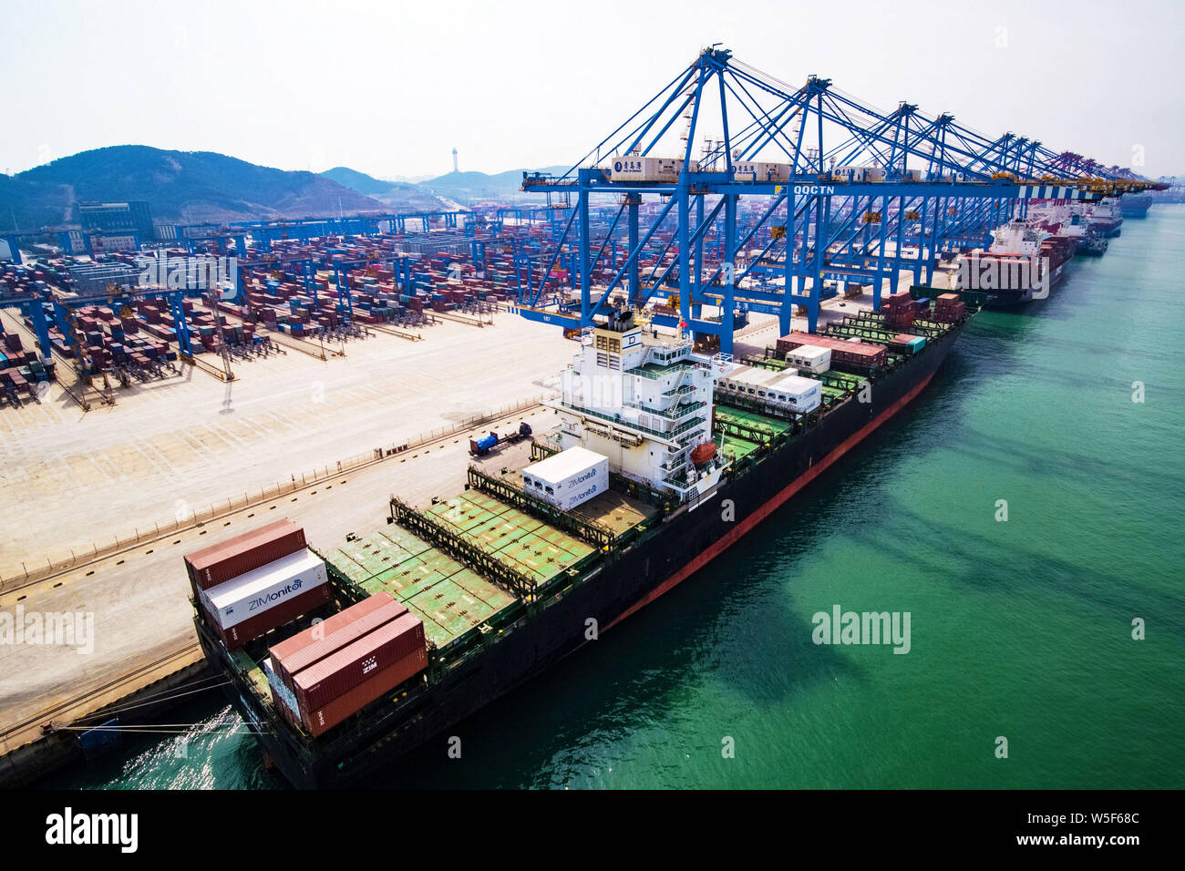 --FILE--An aerial view of containers stacked at the fully automated container terminal at the ...