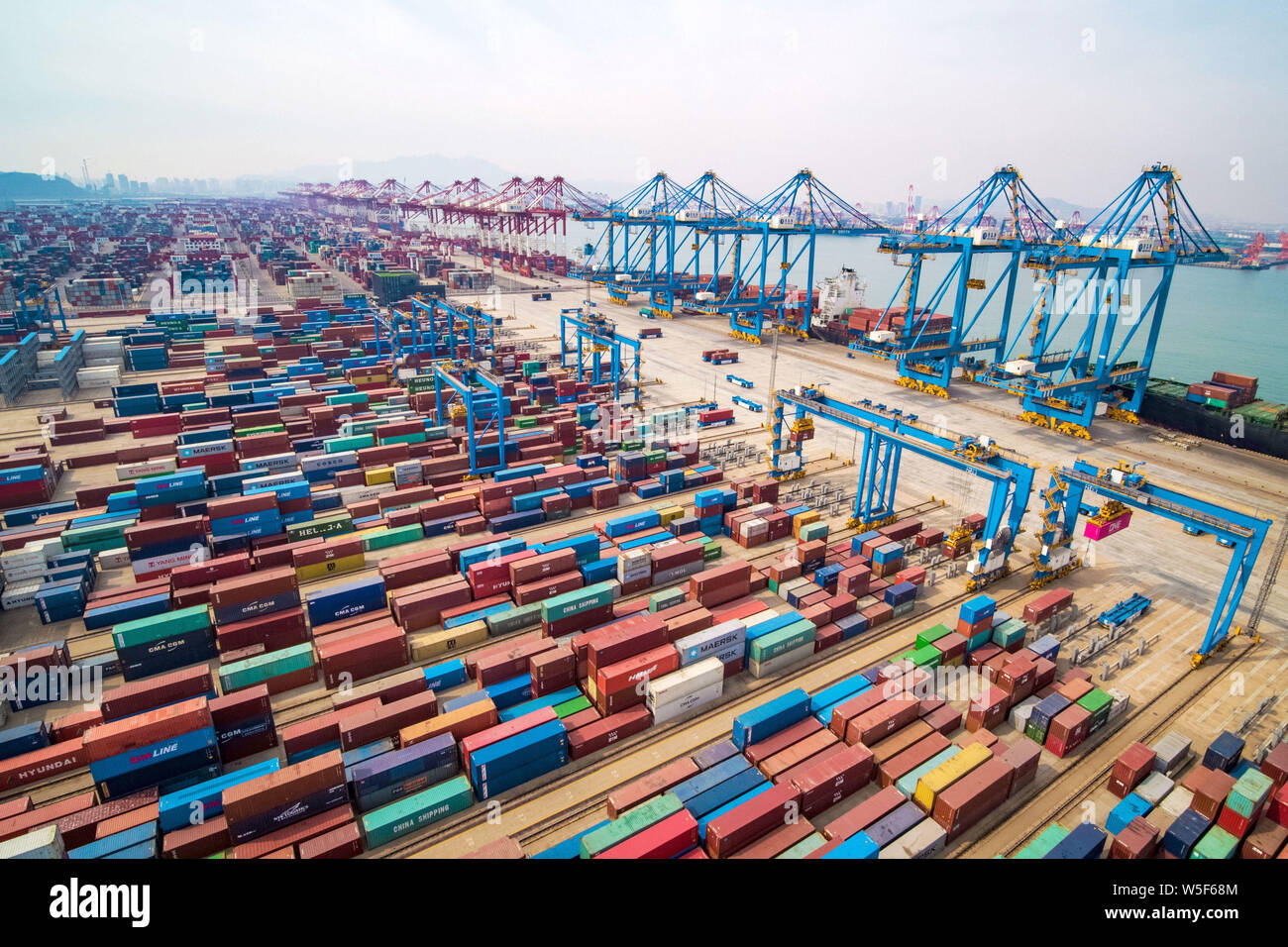 --FILE--An aerial view of containers stacked at the fully automated container terminal at the ...