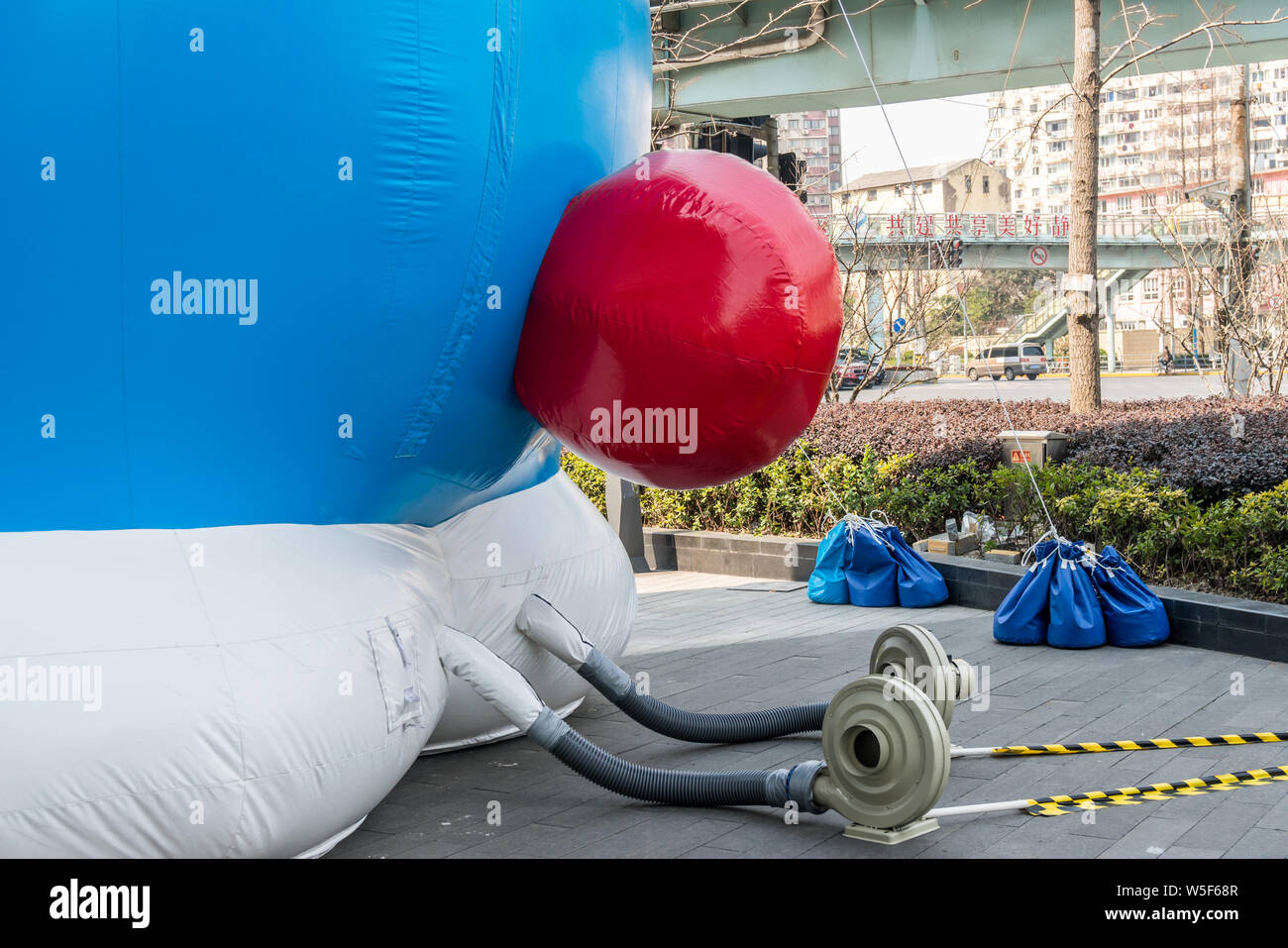 A 10-meter-tall inflated doll featuring shape of Doraemon is displayed ...