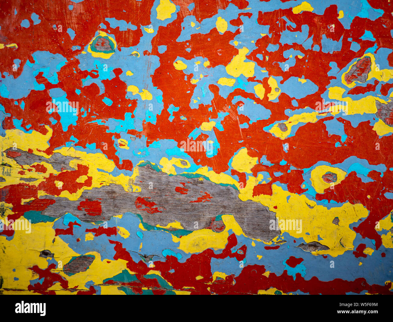 Color cracks,red,yellow,green,blue. Abstract art background. Old oil ...