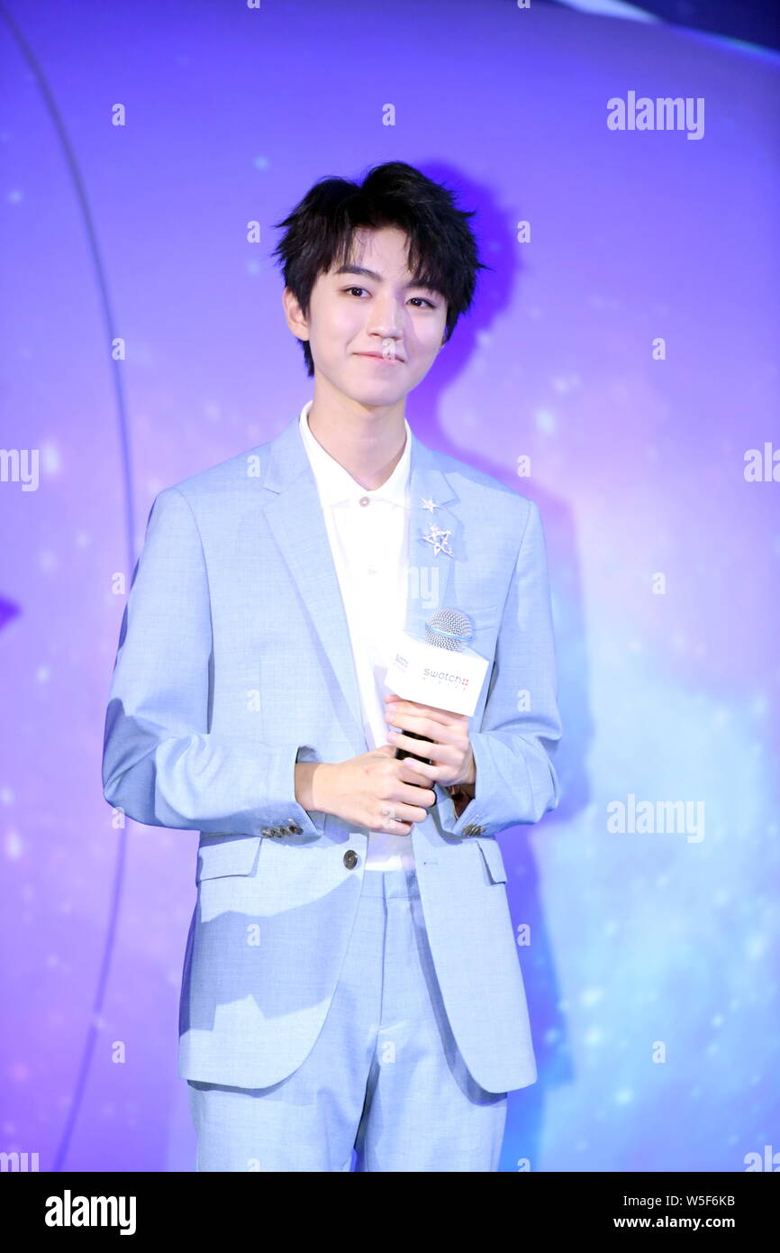 Karry Wang Jun Kai of Chinese boy group TFBoys attends a promotional ...