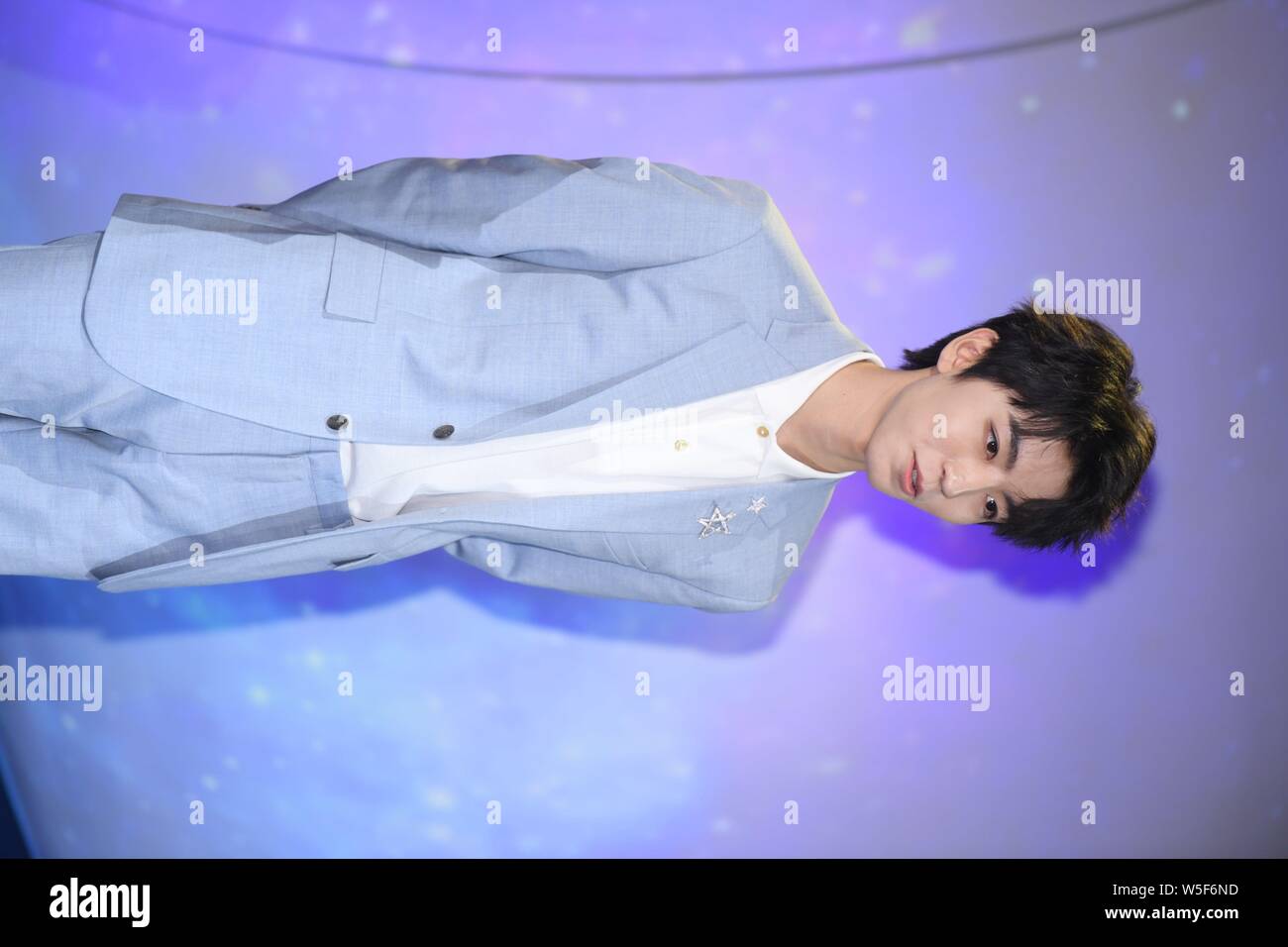 Karry Wang Jun Kai of Chinese boy group TFBoys attends a promotional ...