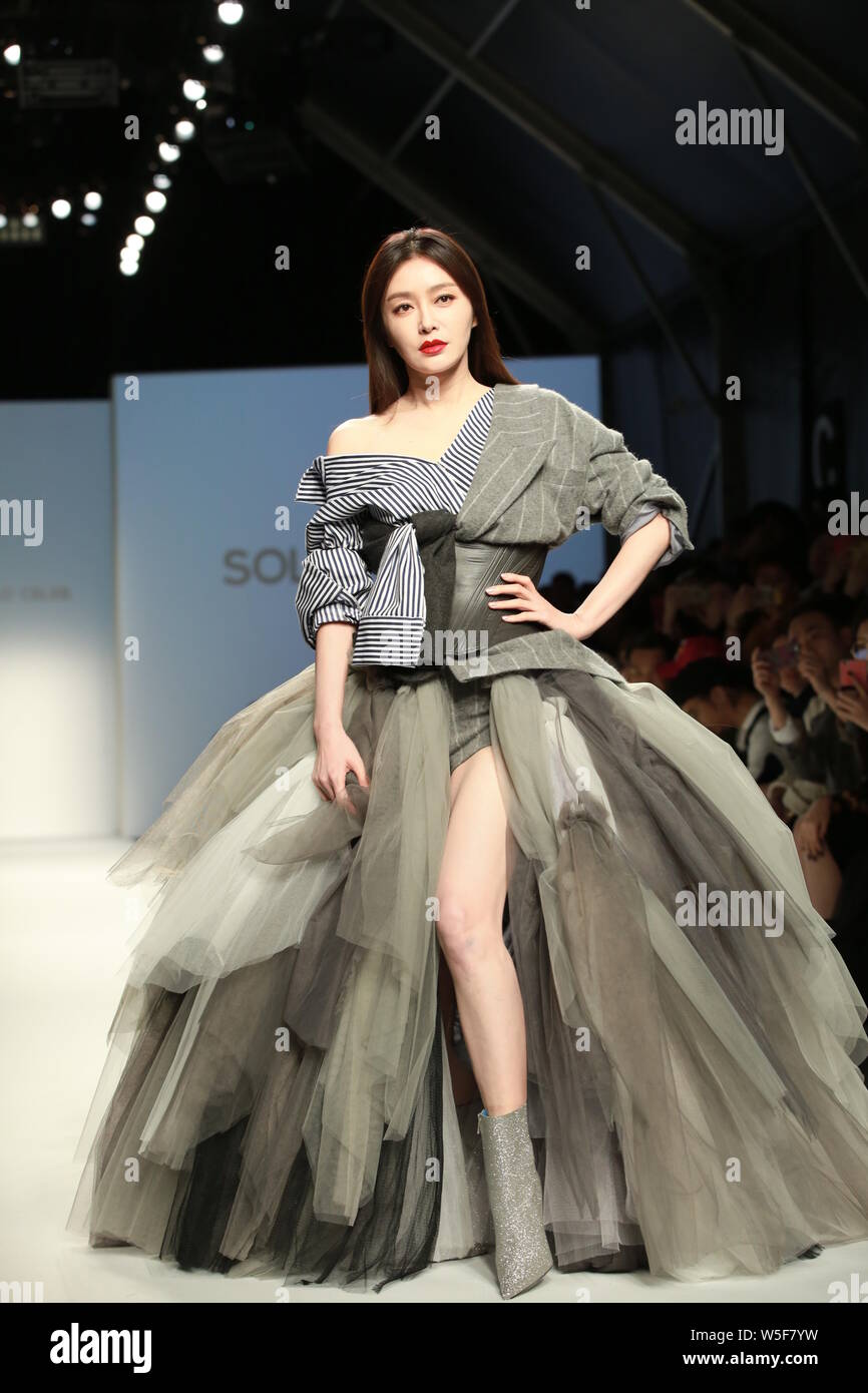 Chinese actress Qin Lan displays a new creation at the Solo Celeb ...