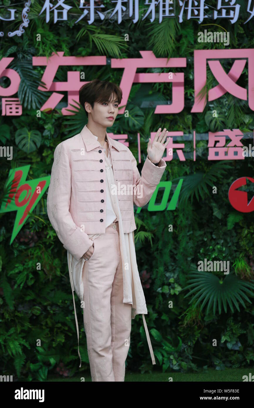 Lin Yanjun of Chinese boy group Nine Percent poses as he arrives on the ...