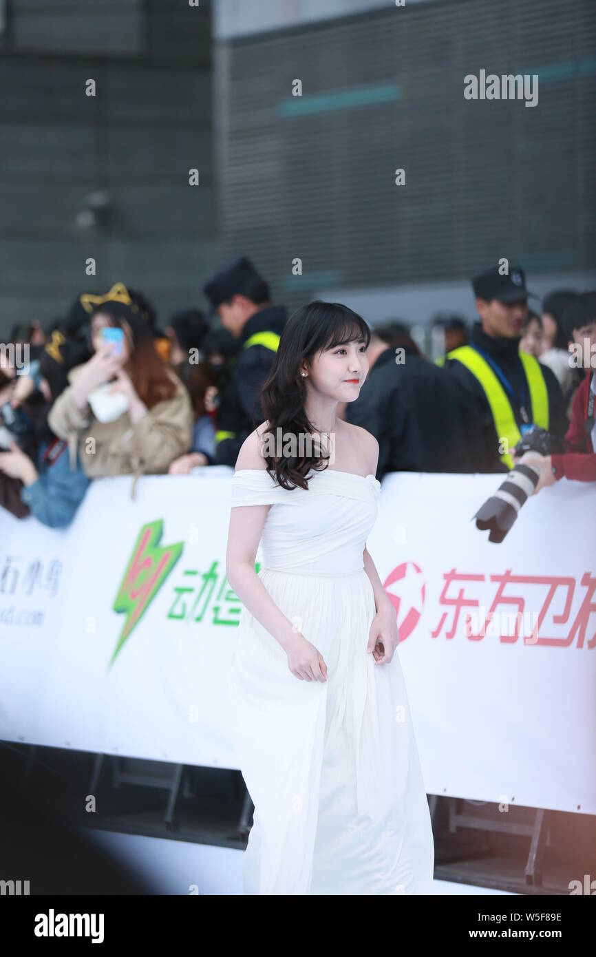Singer Li Yitong of Chinese idol group SNH48 poses as she arrives for ...