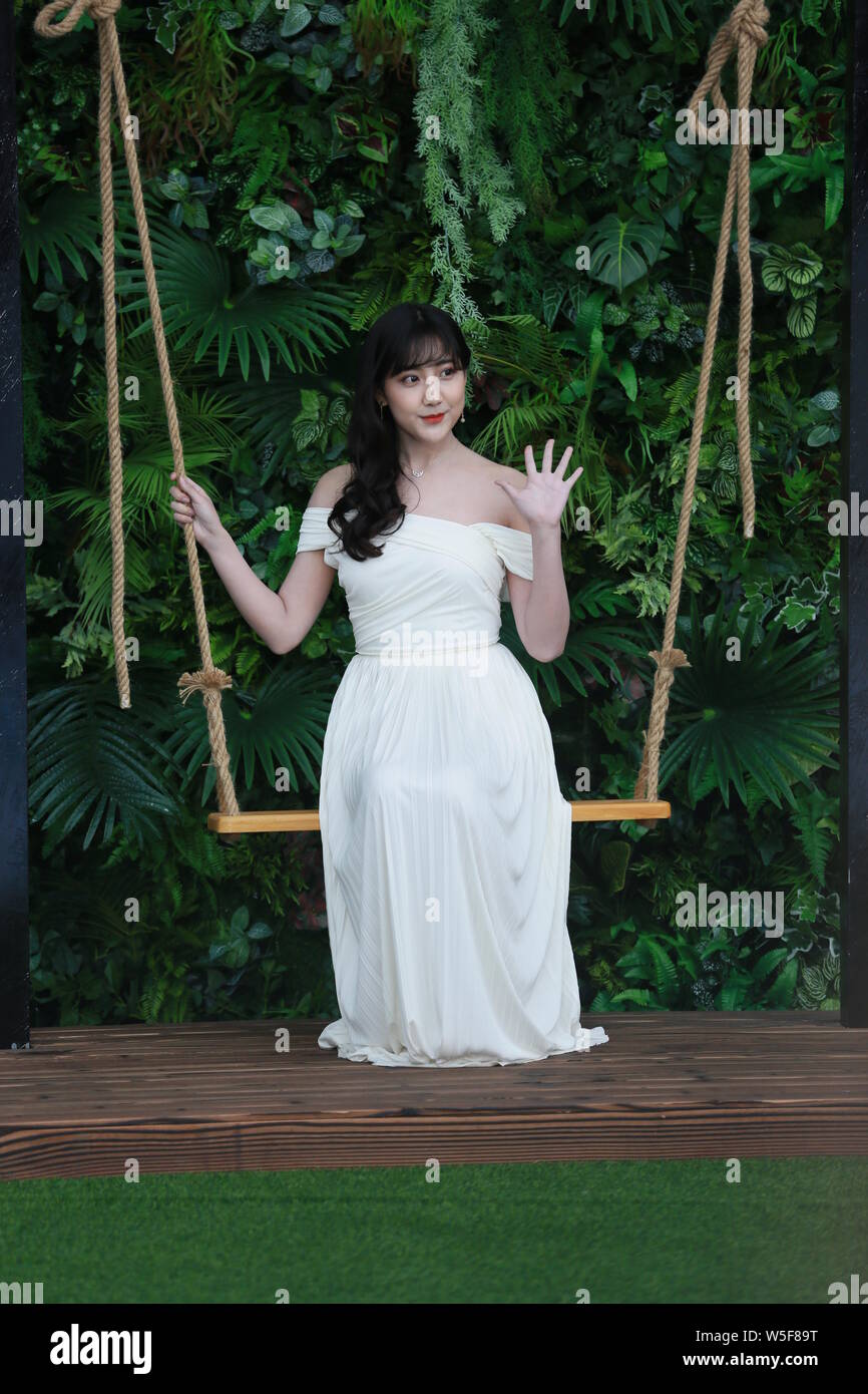 Singer Li Yitong of Chinese idol group SNH48 poses as she arrives for ...