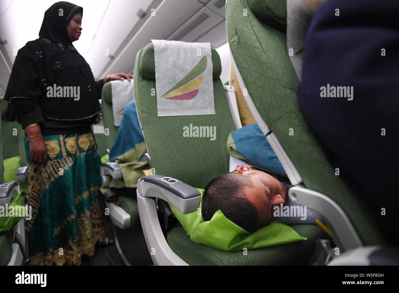 --FILE--Chinese passengers are pictured on the Ethiopian Airlines ...