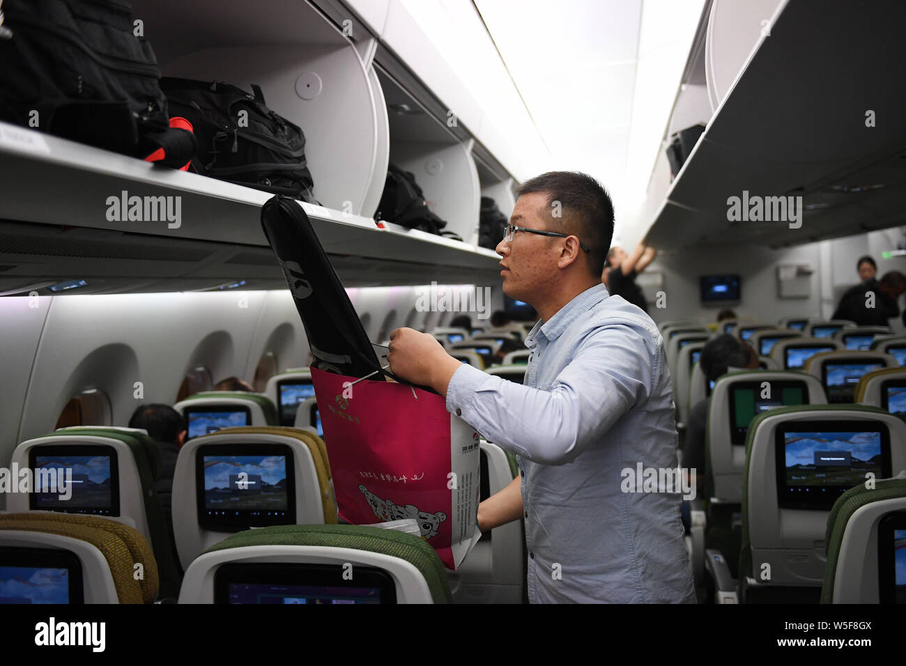 --FILE--Chinese passengers are pictured on the Ethiopian Airlines ...