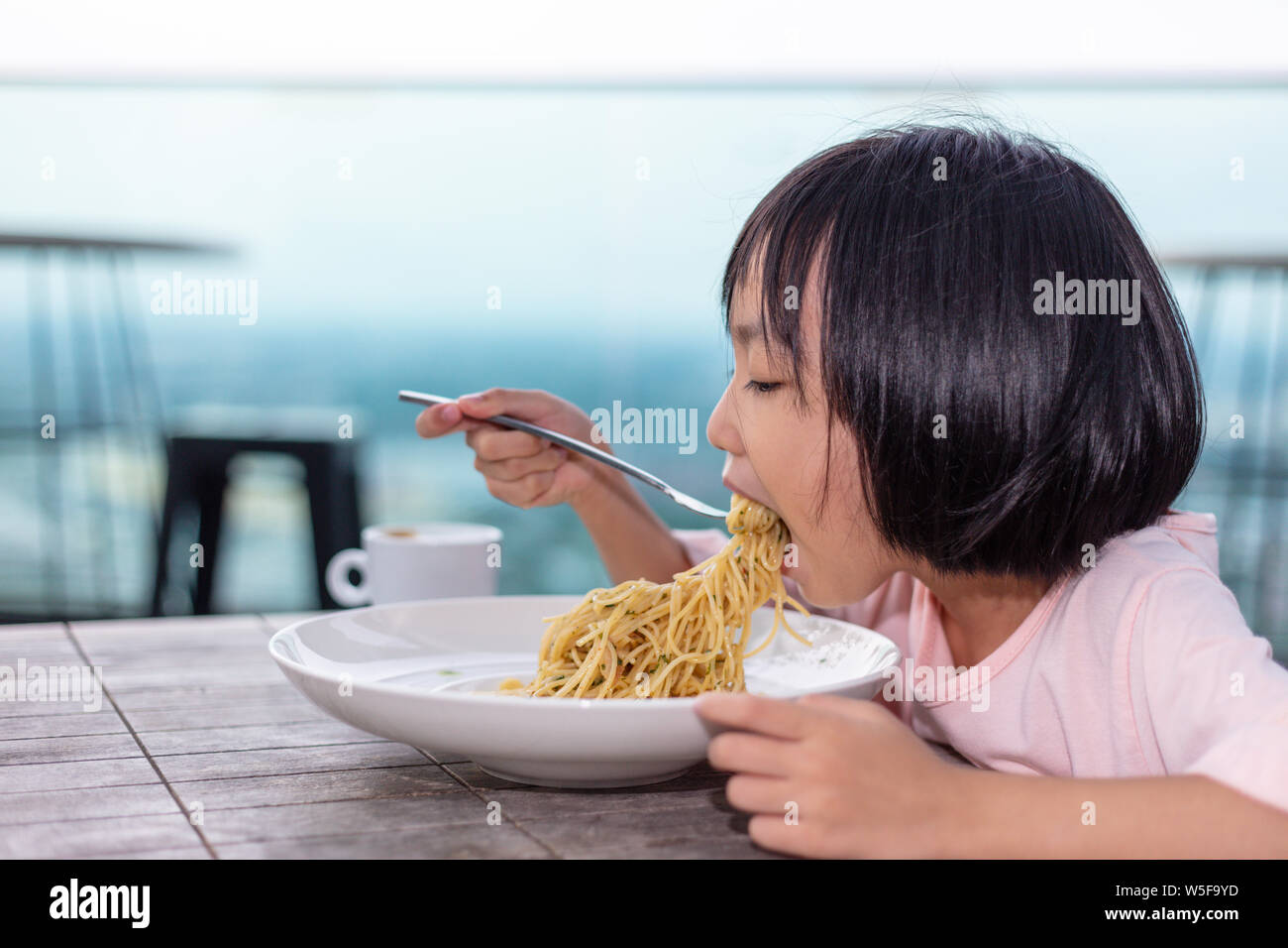 Girl Eating Spaghetti High Resolution Stock Photography and Images - Alamy