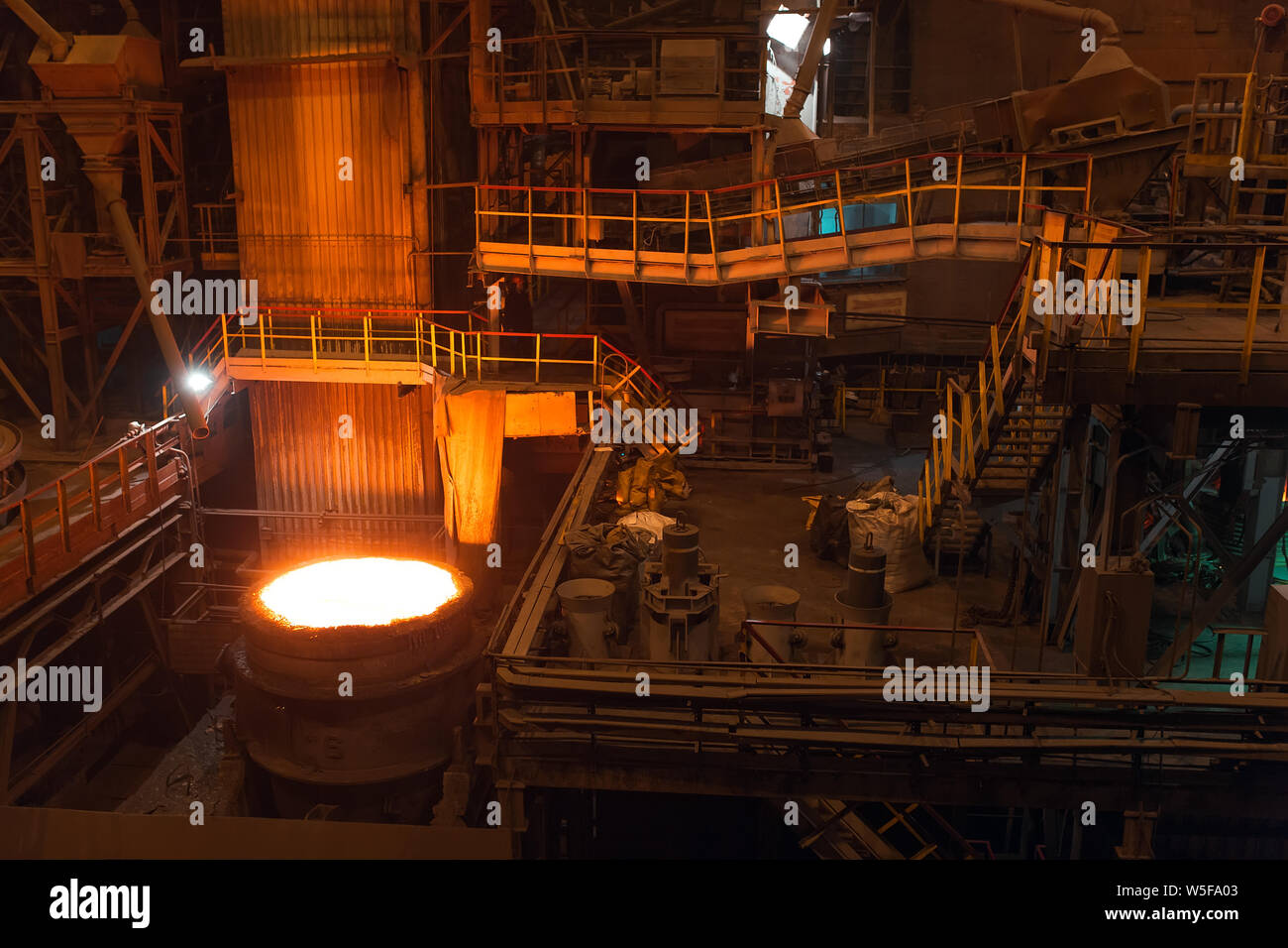 Melting of metal in a steel plant. High temperature in the melting ...