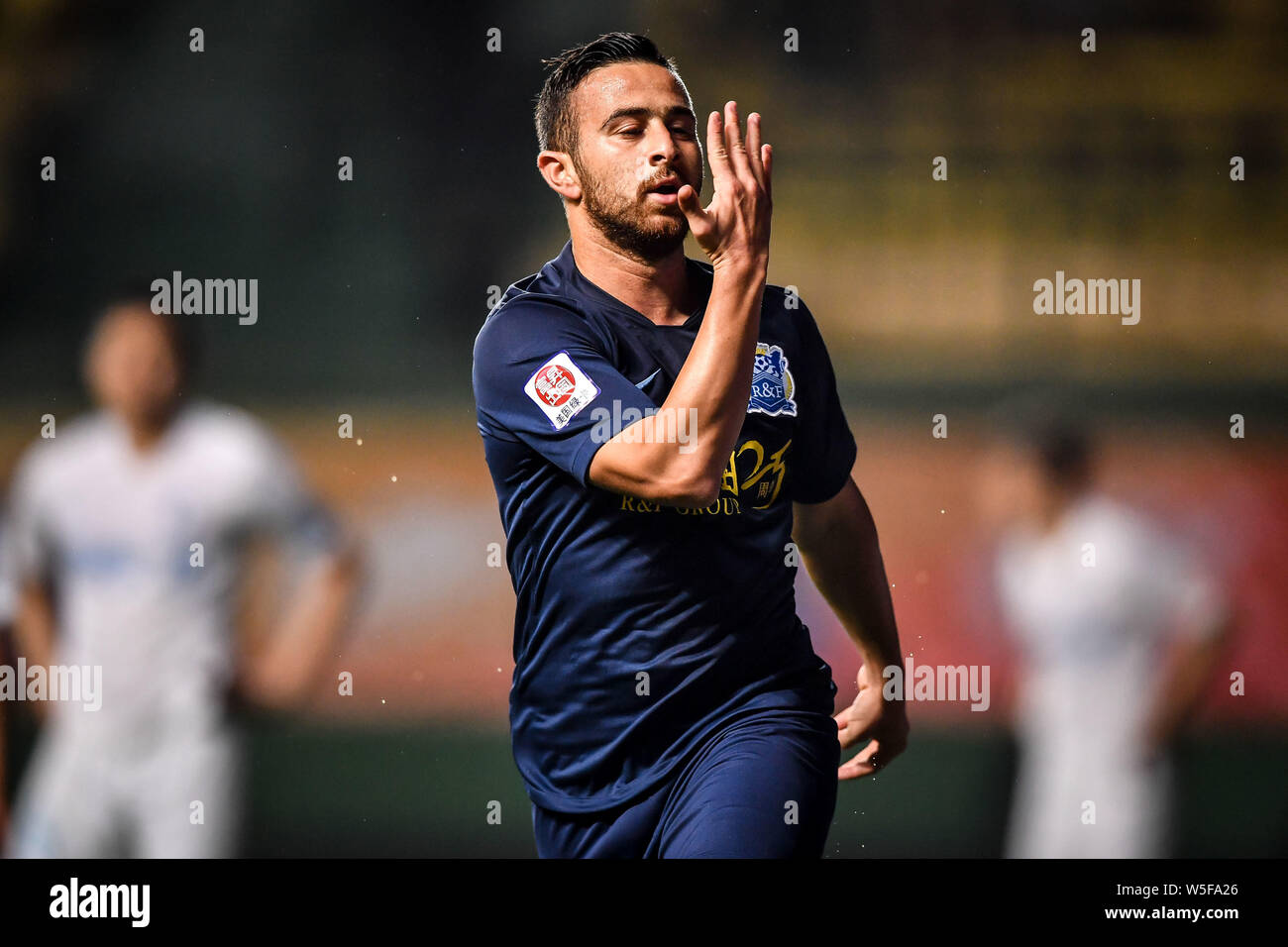 Israeli-Arab football player Dia Saba of Guangzhou R&F celebrates after ...