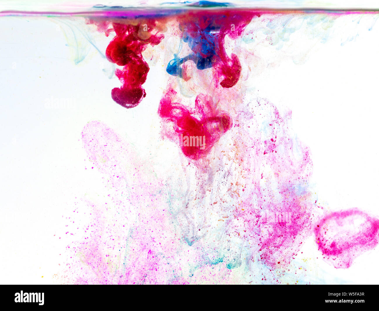 Poster color in water. Abstract background Stock Photo - Alamy