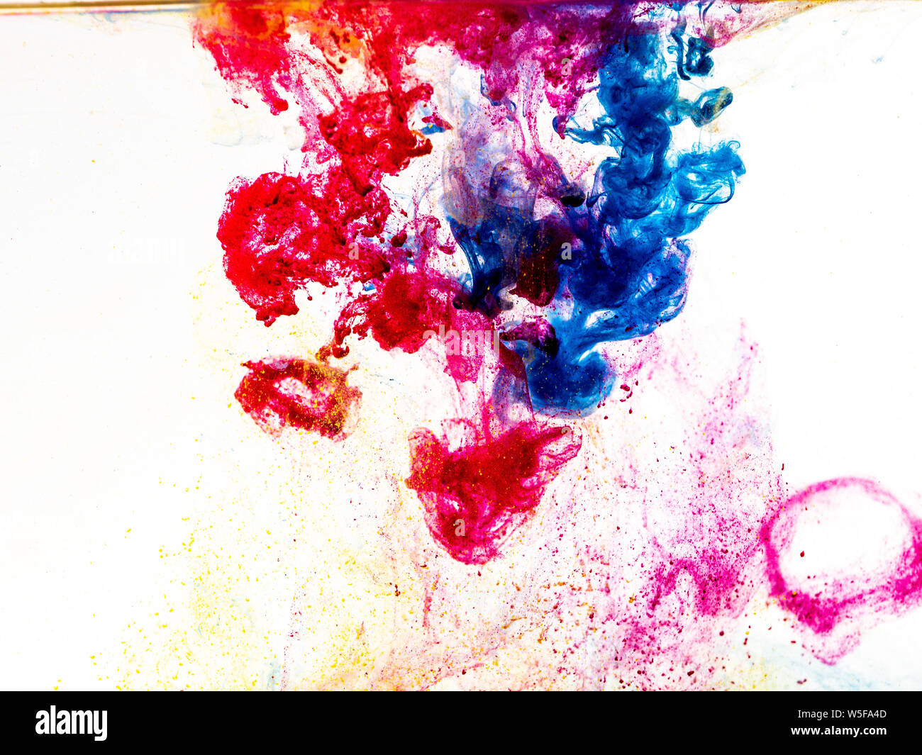 Poster color in water. Abstract background Stock Photo - Alamy