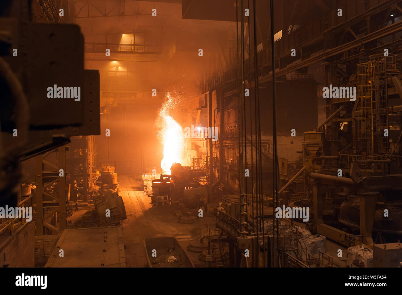 Melting of metal in a steel plant. High temperature in the melting ...