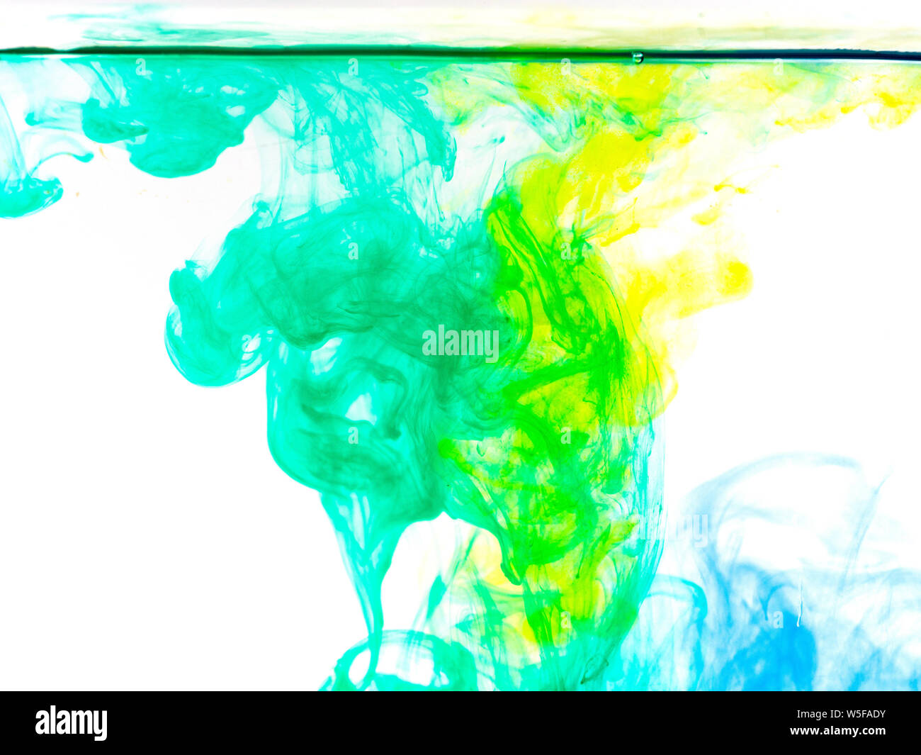 Poster color in water. Abstract background Stock Photo - Alamy