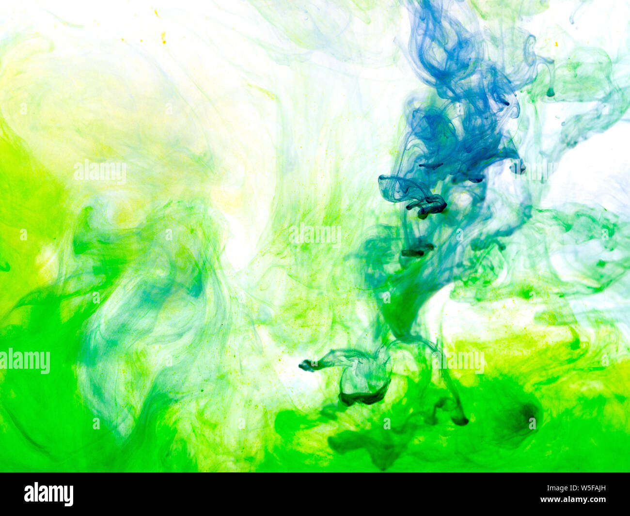 Poster color in water. Abstract background Stock Photo - Alamy