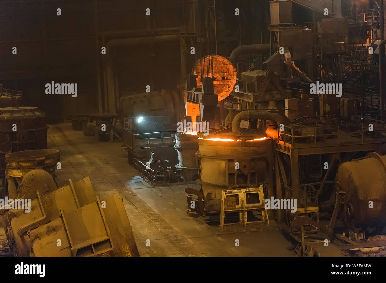 Melting of metal in a steel plant. High temperature in the melting ...