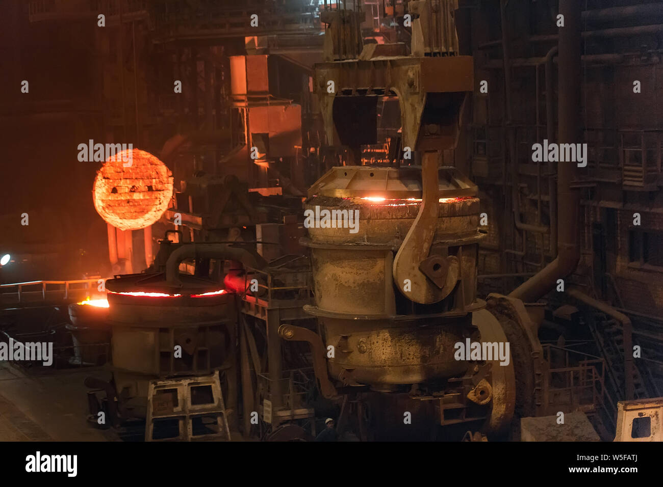 Melting of metal in a steel plant. High temperature in the melting ...