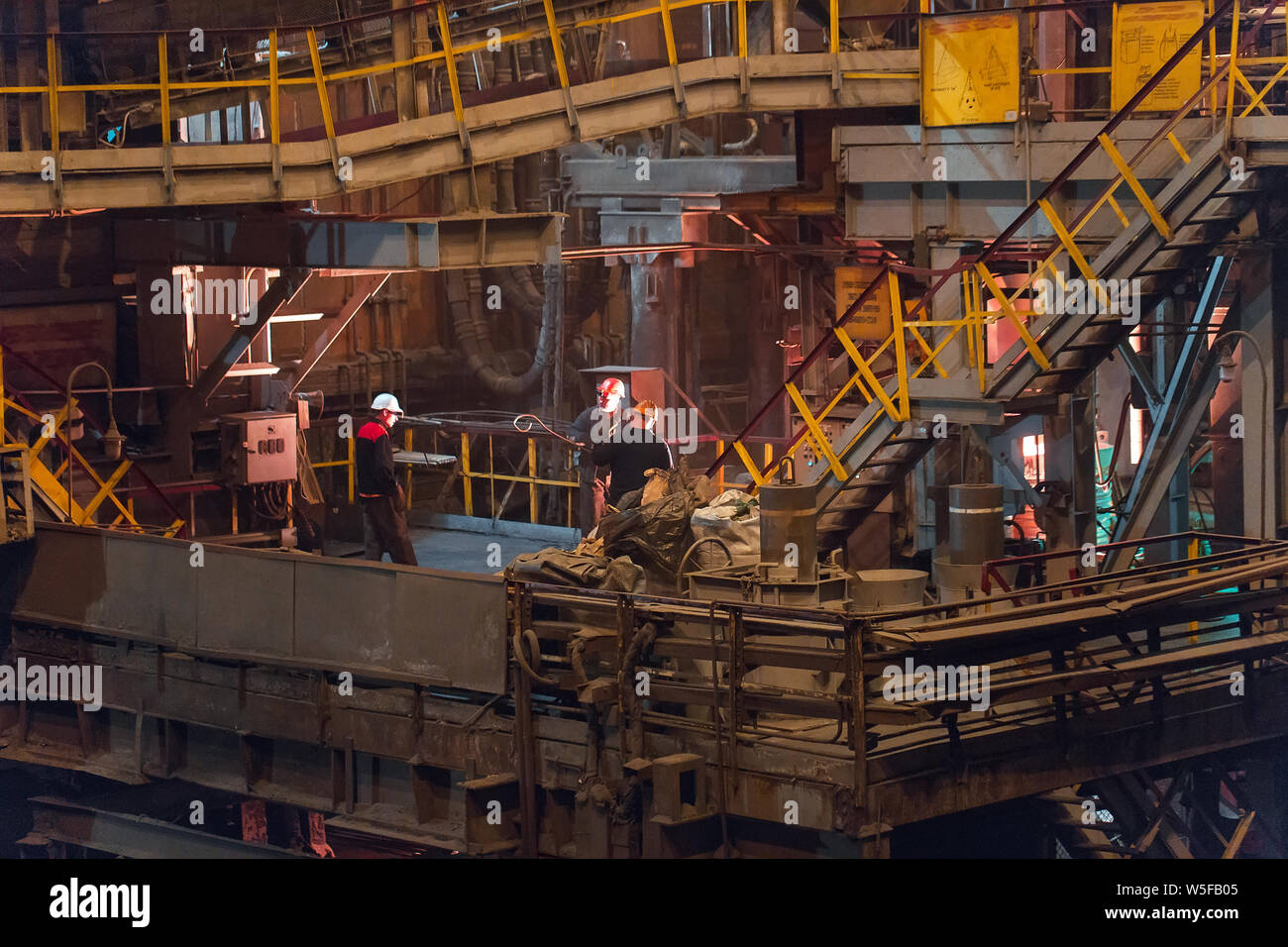 Melting of metal in a steel plant. High temperature in the melting ...