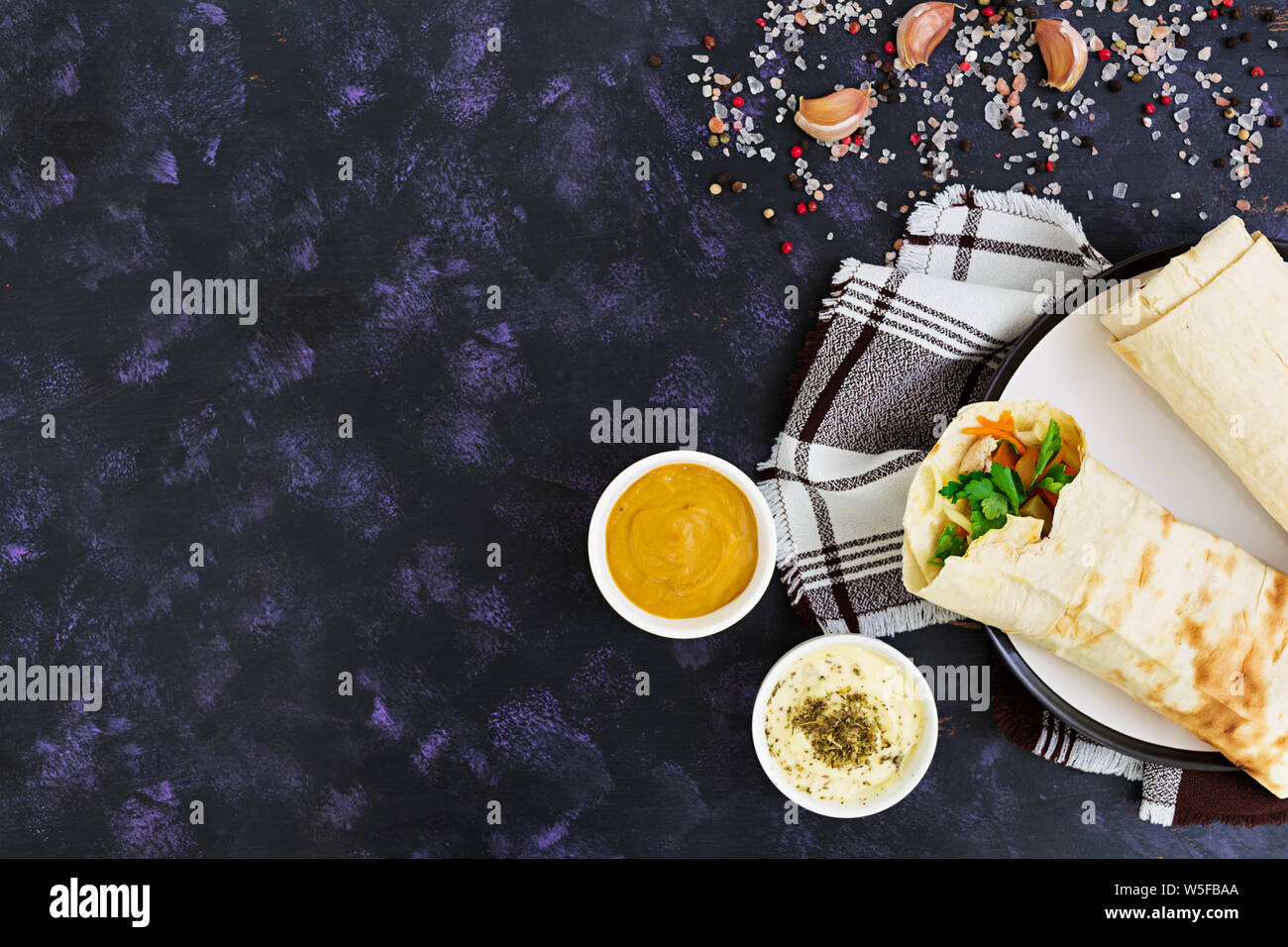 Shawarma sandwich with ingredients on dark background. Top view Stock ...