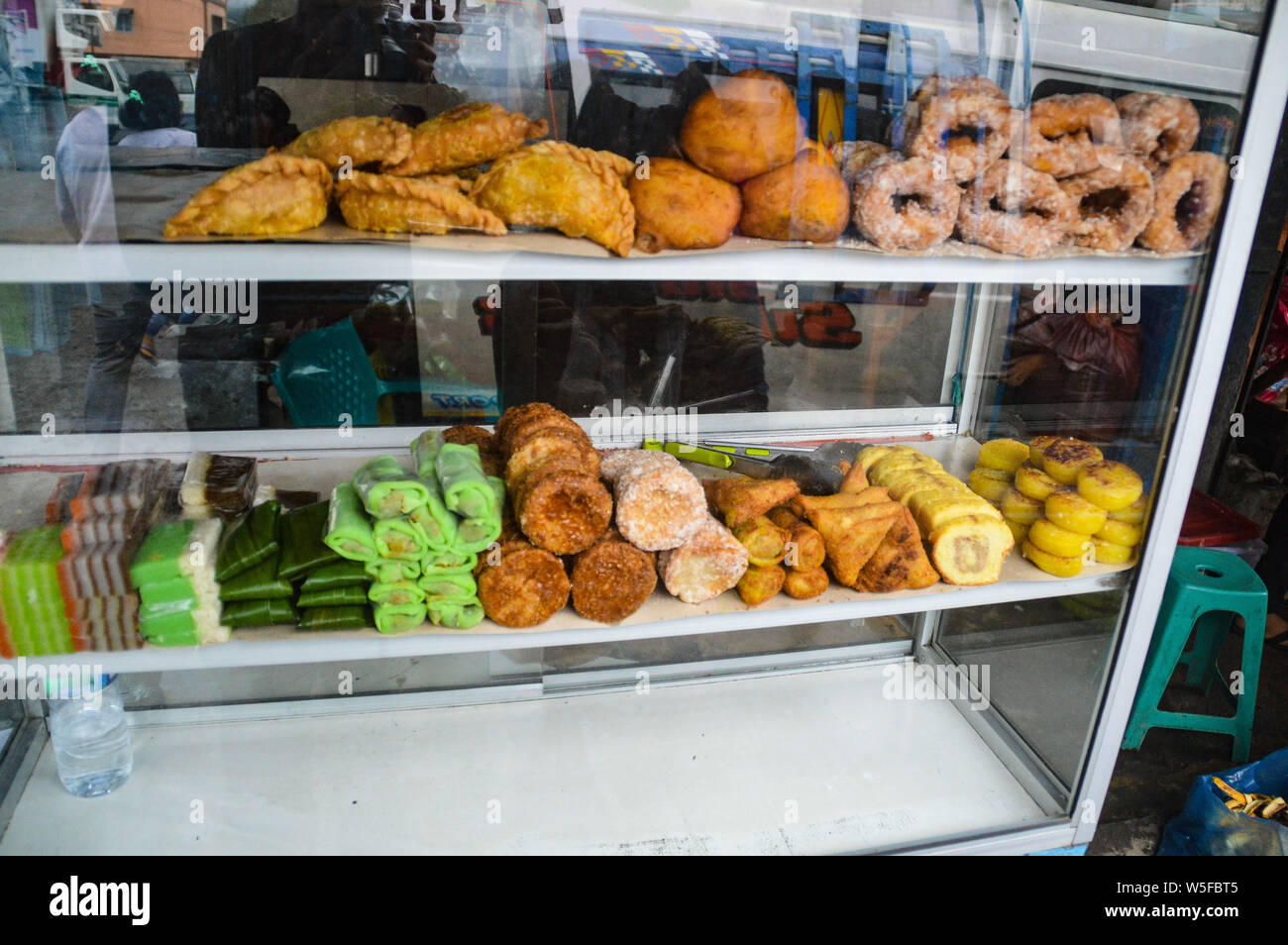 Traditional Indonesian snacks sold in small street stalls across Medan ...