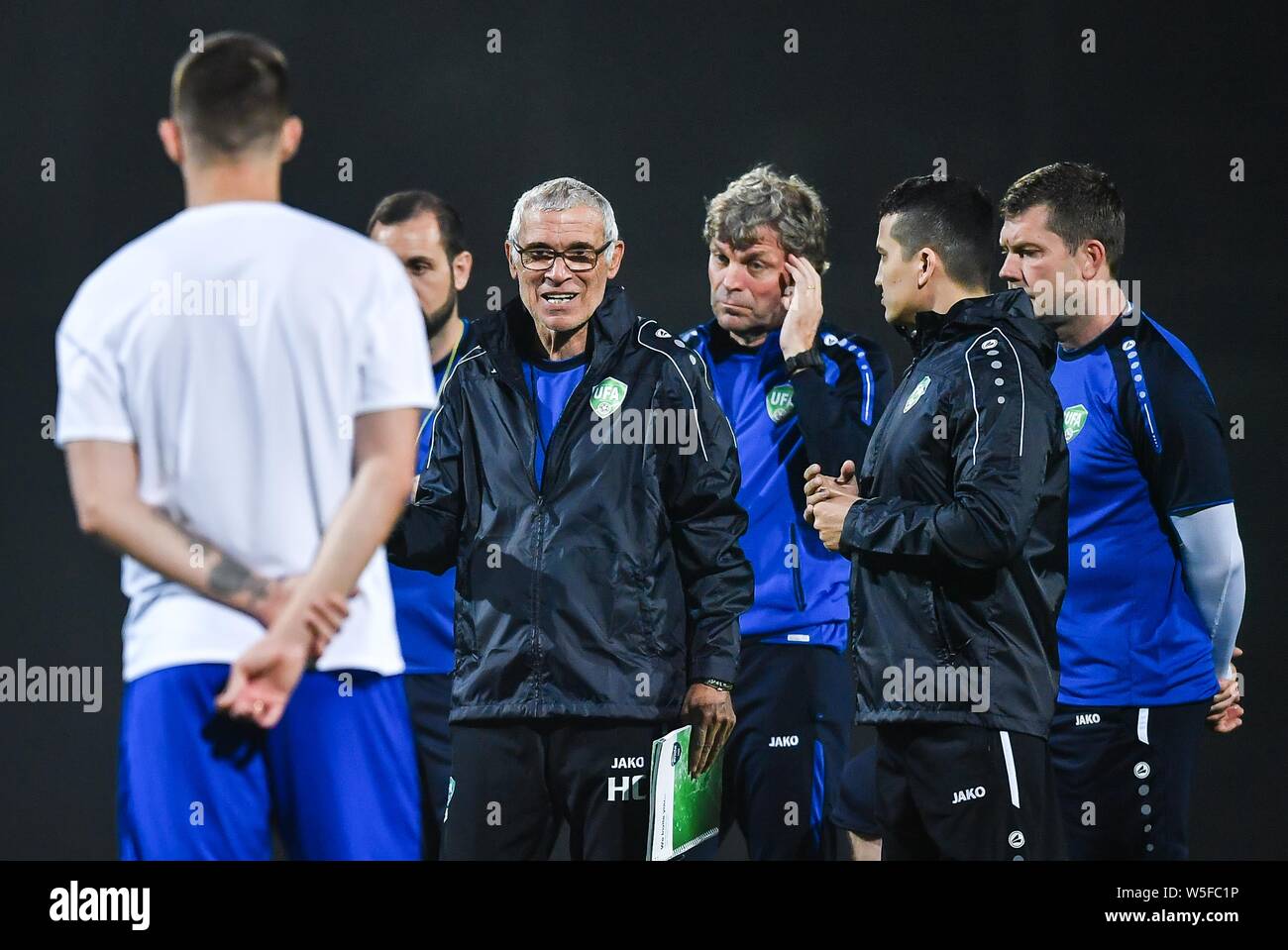 Players of Uzbekistan national men's football team take part in a ...