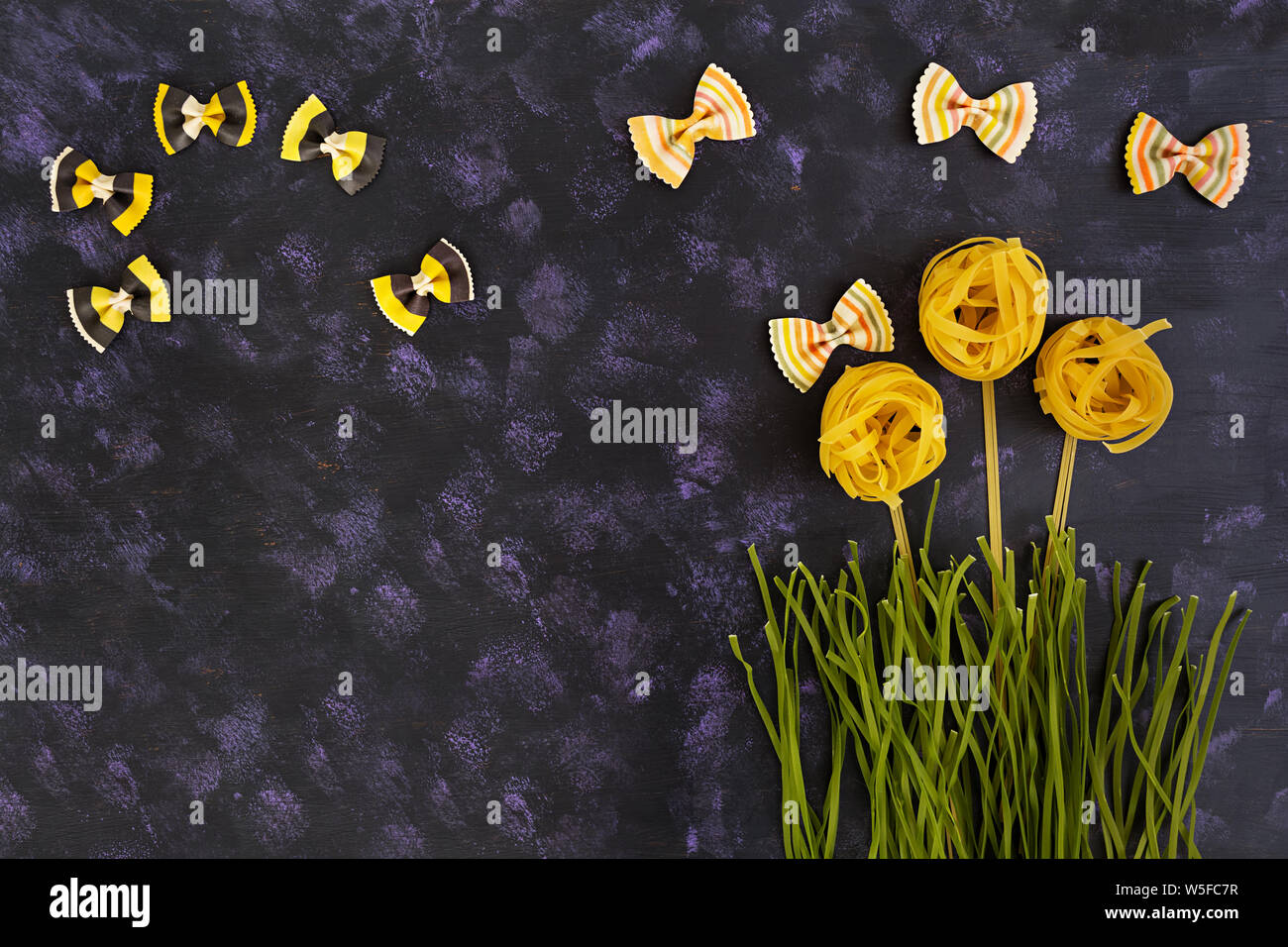 Dry pasta background. Different pasta on dark background. Flat lay. Top ...