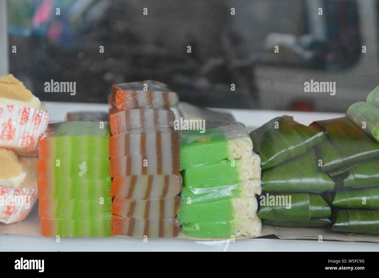 Traditional Indonesian snacks sold in small street stalls across Medan ...