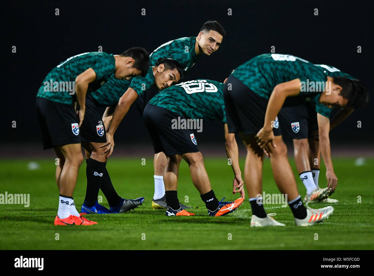 Players of Thailand national men's football team take part in a ...