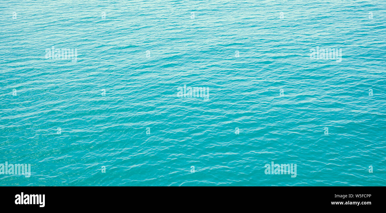 Panorama of clear blue sea with waves background Stock Photo - Alamy