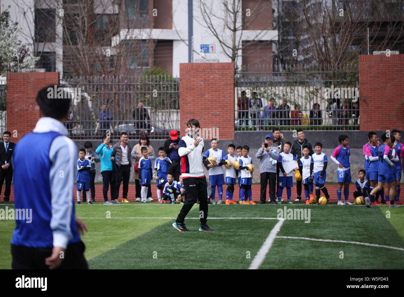 Spanish former football player Fernando Morientes plays football with ...