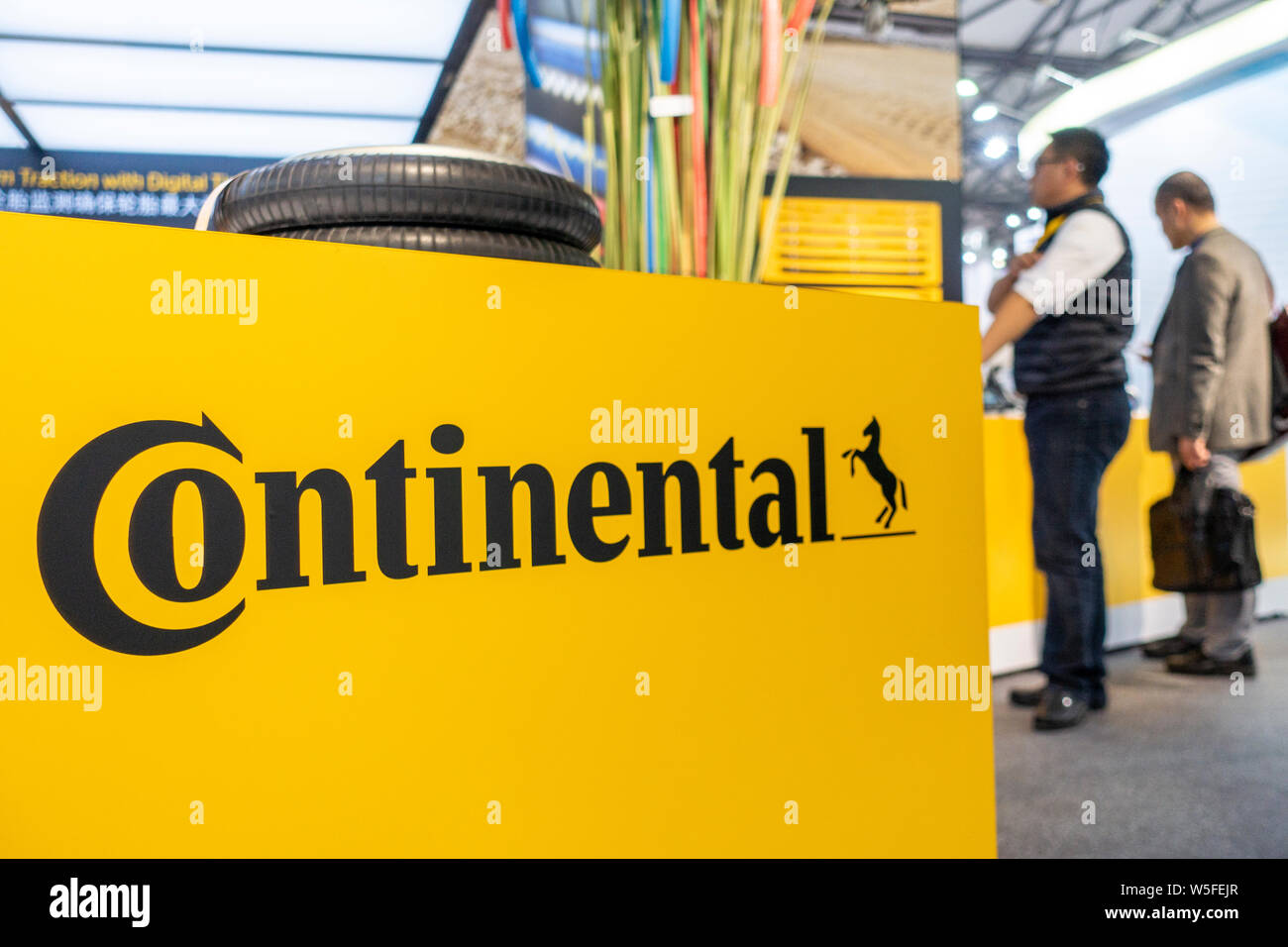 --FILE--People visit the stand of Continental AG during an expo in ...