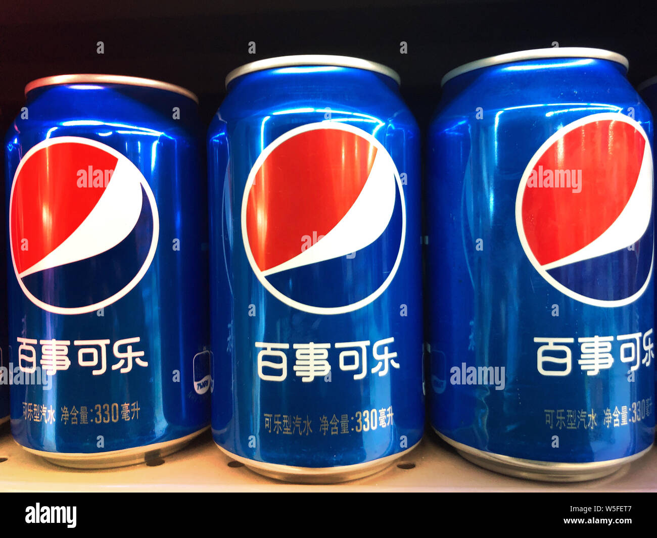 --FILE--Bottles of Pepsi cola of PepsiCo are for sale at a supermarket ...