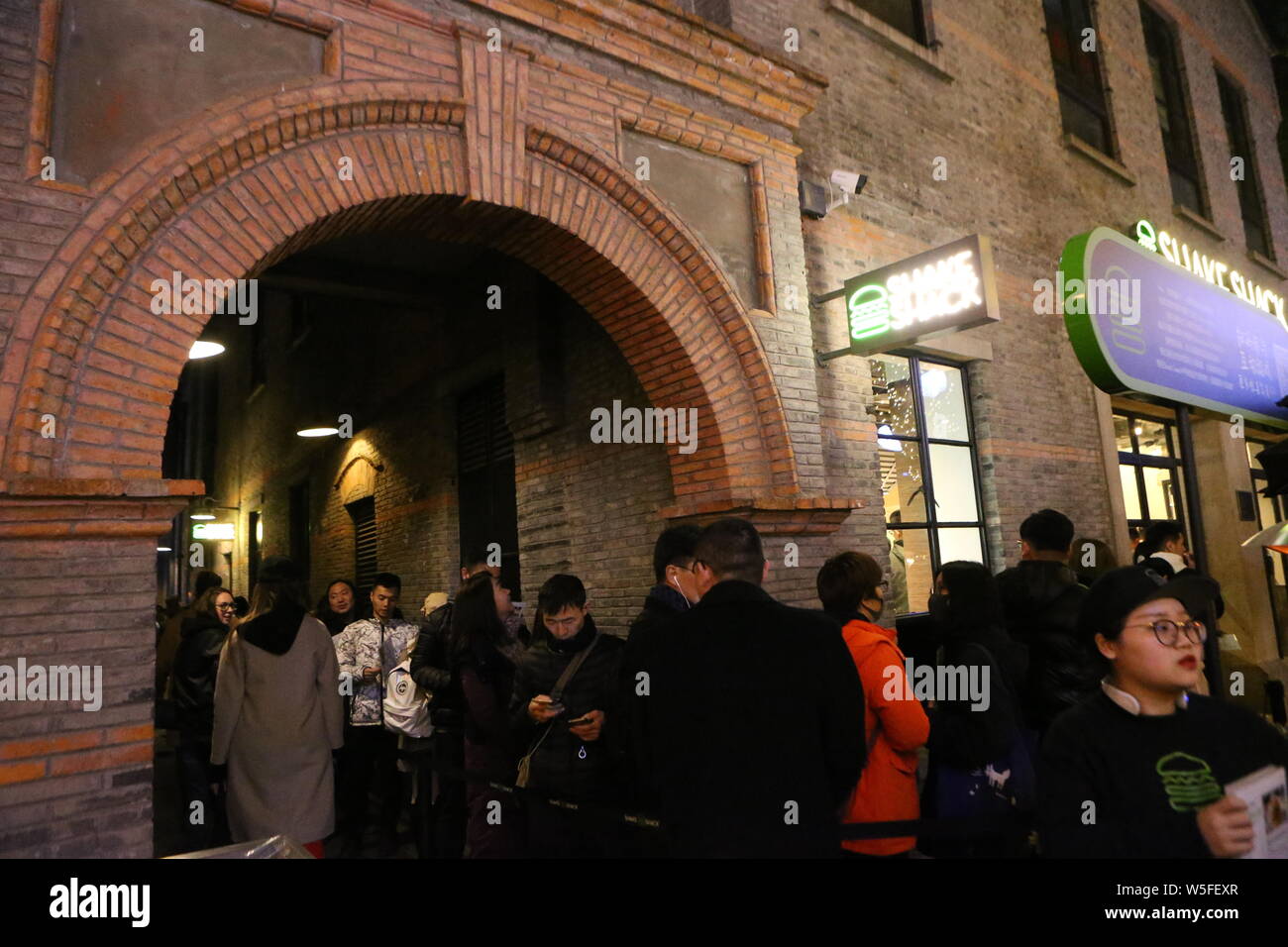 Chinese customers queue up outside the first Mainland China Shake Shack ...