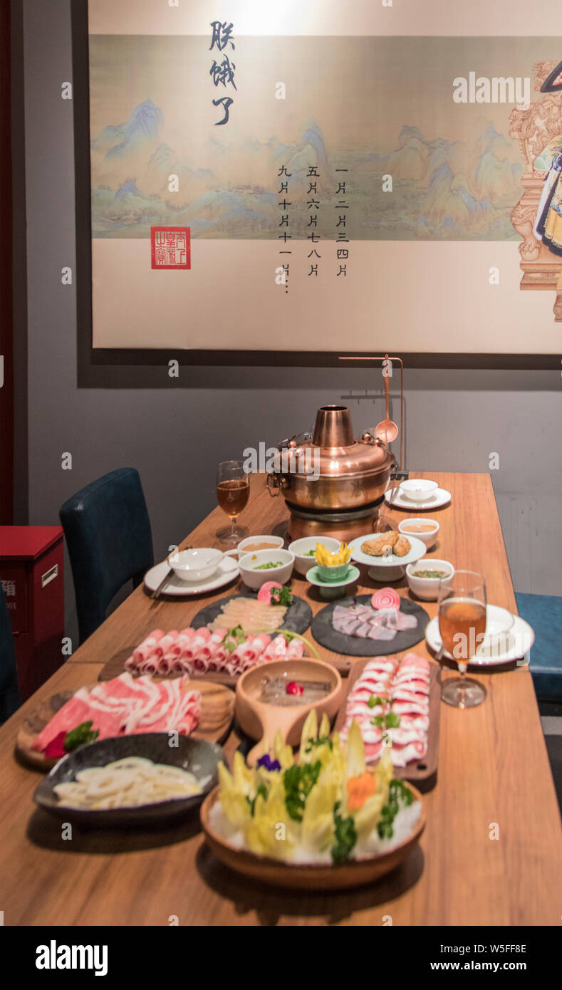 View of the hot pot featuring chrysanthemum soup stock in the Corner ...