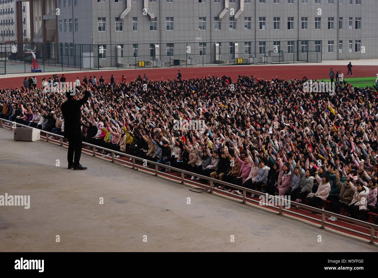 Chinese students attend a mass rally for the upcoming annual college ...