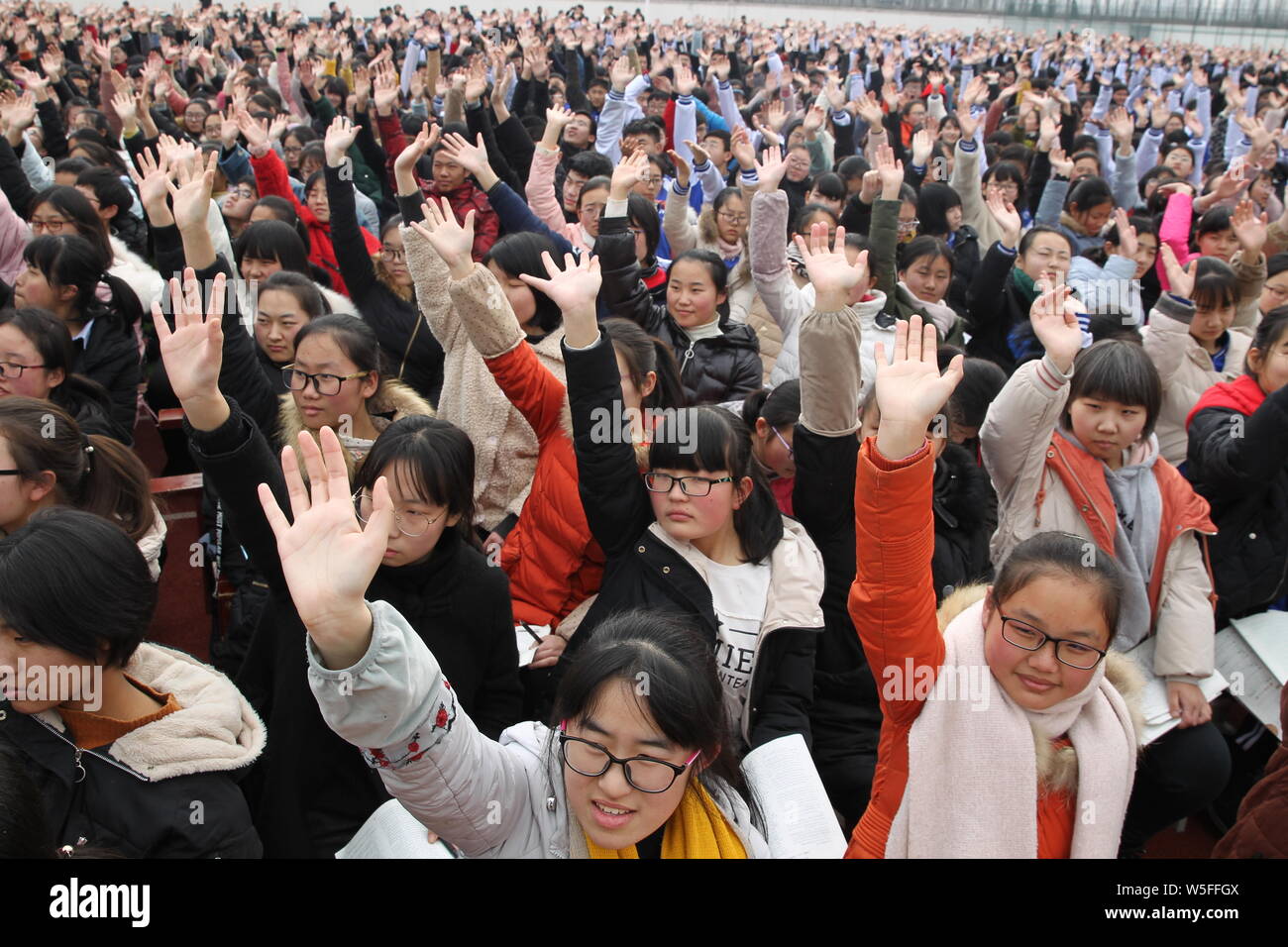Chinese students attend a mass rally for the upcoming annual college ...