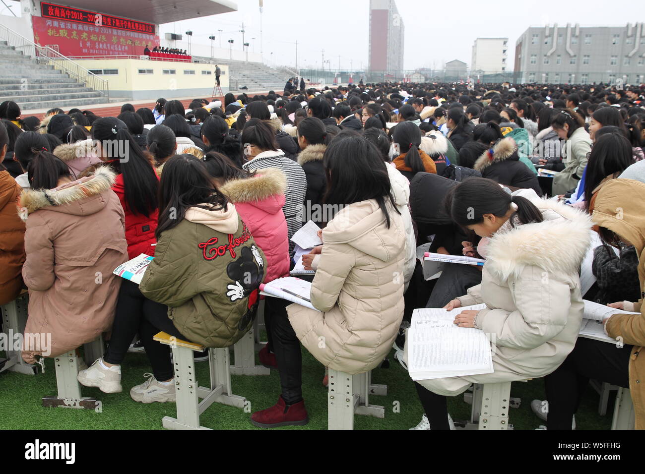 Chinese students attend a mass rally for the upcoming annual college ...