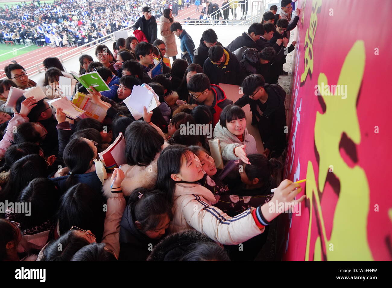 Chinese students attend a mass rally for the upcoming annual college ...