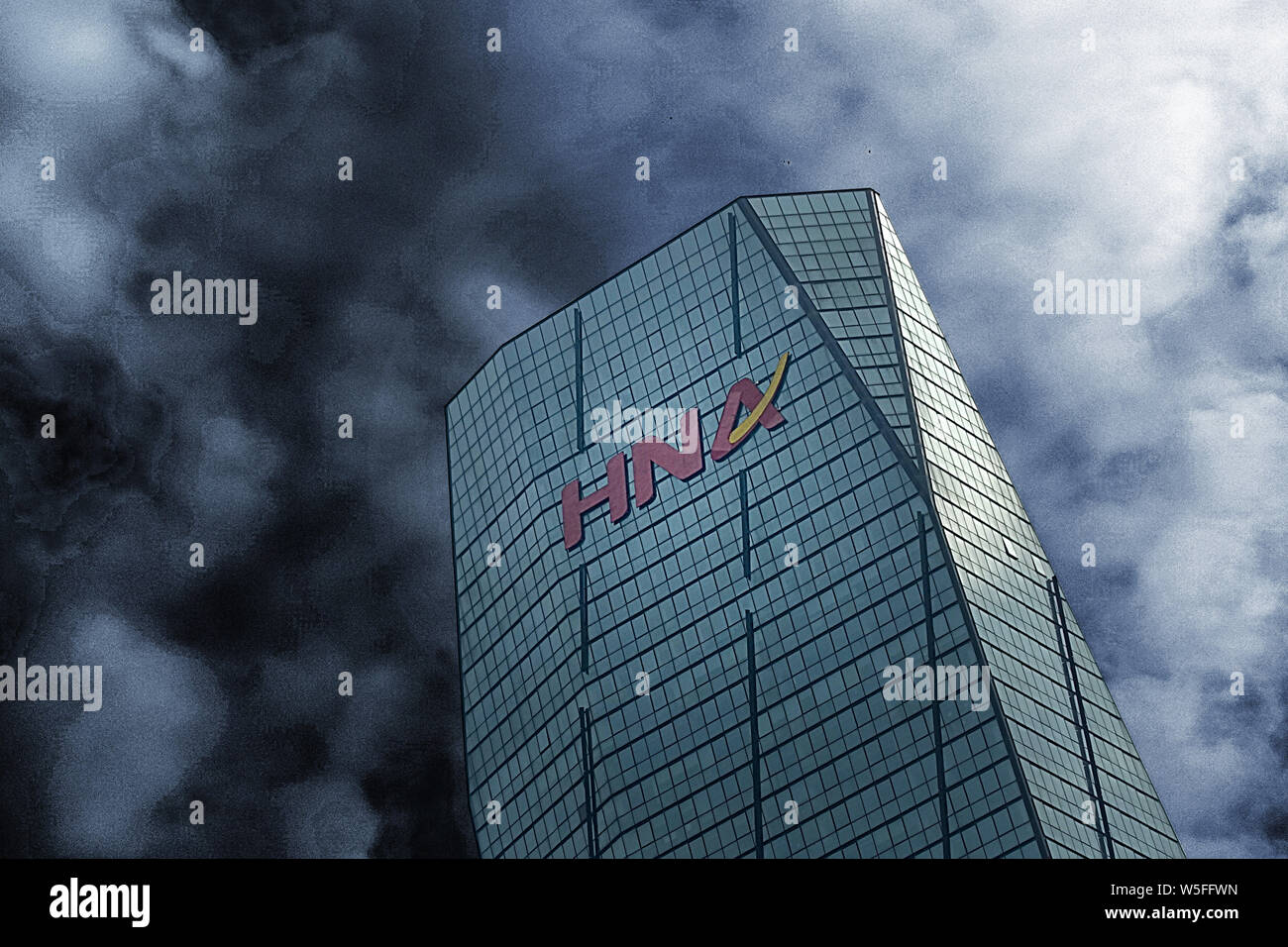 --FILE--A logo of HNA is pictured on an office building of HNA Group in ...