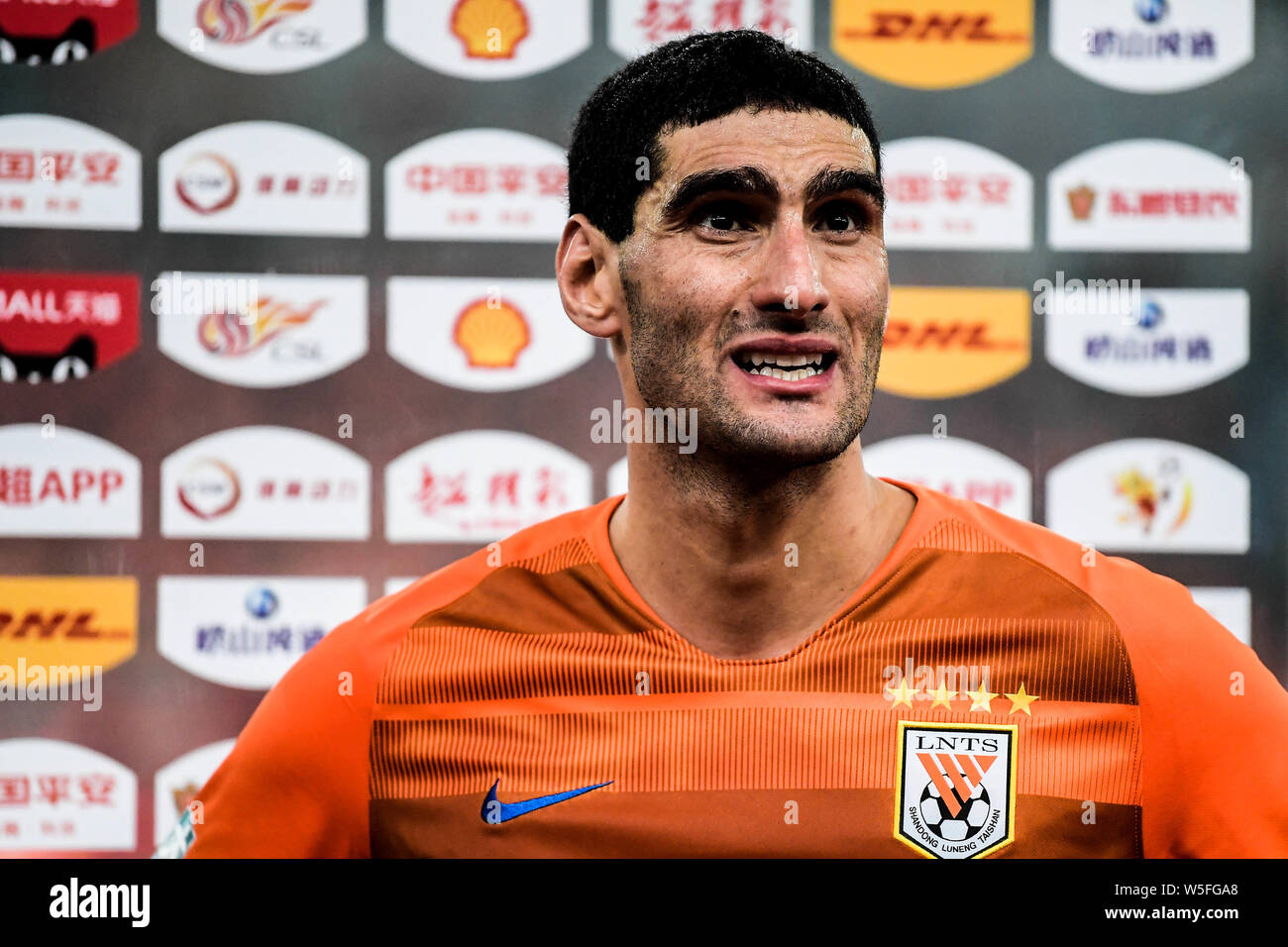 Belgian football player Marouane Fellaini receives an interview after ...