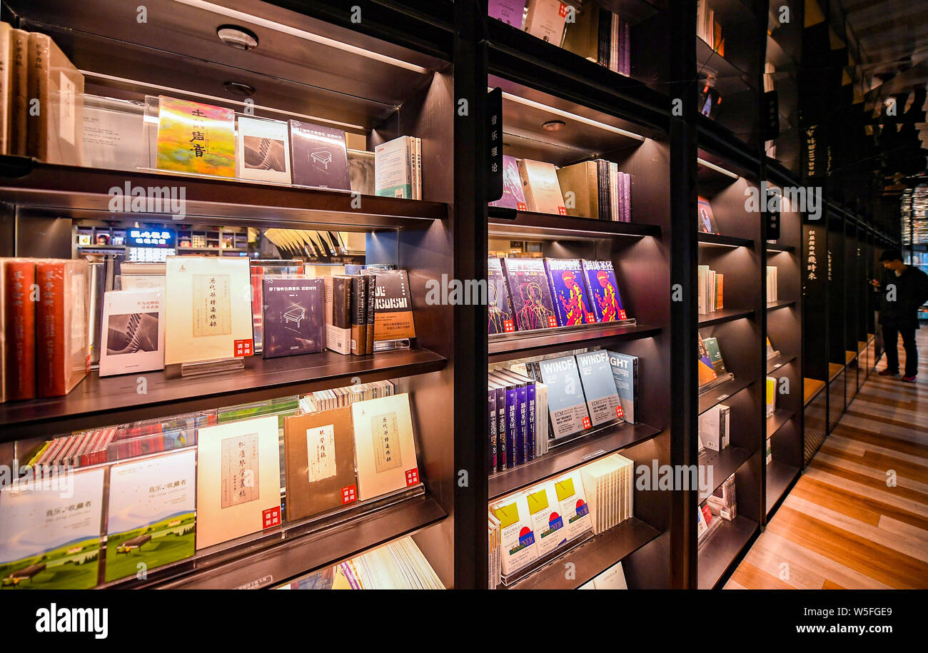 Books are on display on the giant book shelf, which spans 240 meters ...