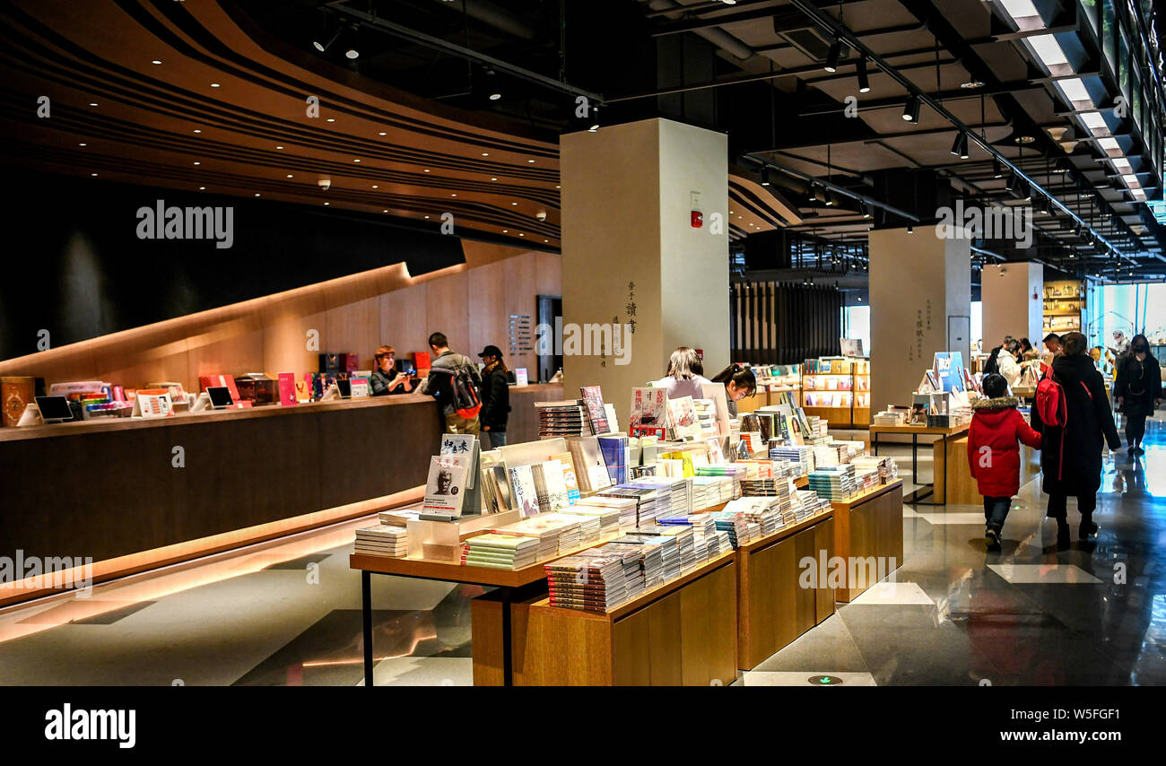Books are on display on the giant book shelf, which spans 240 meters ...