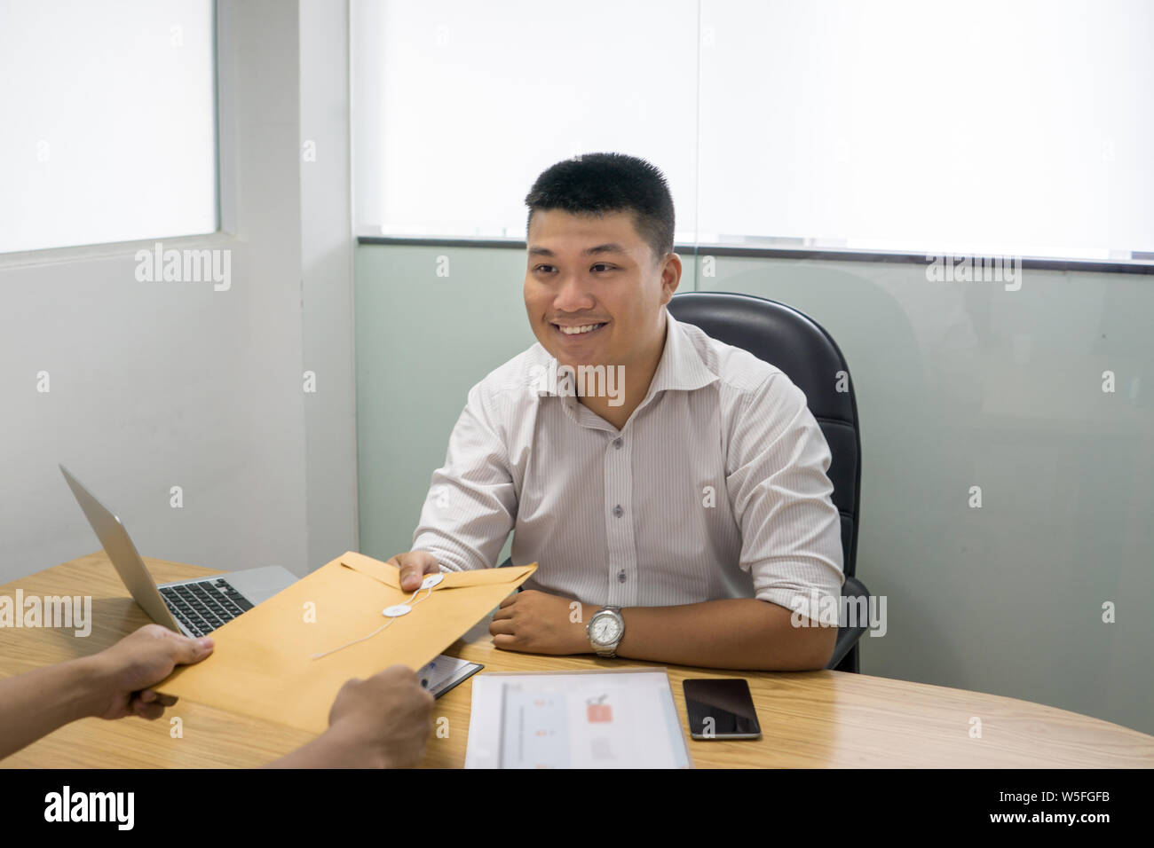 Interviewer smiling hi-res stock photography and images - Alamy