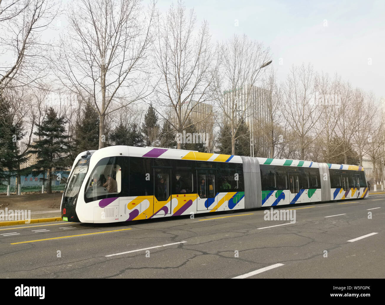 A railless train, developed by the CRRC Zhuzhou Institute Co. Ltd, on a ...